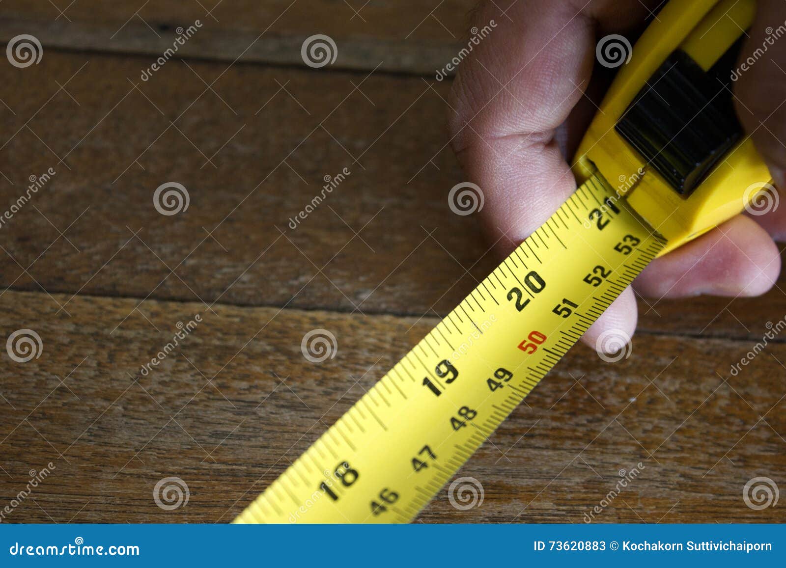 Measuring tape in hand stock image. Image of ruler, surveyors - 73620883