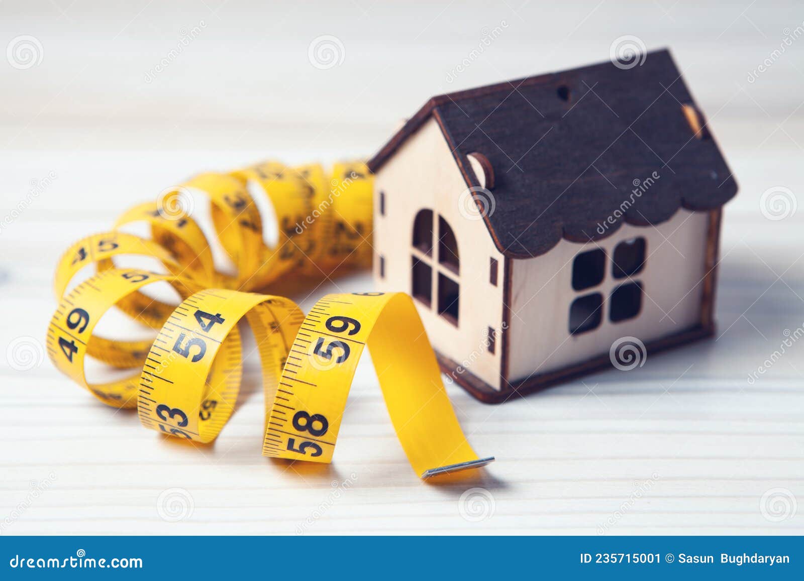 Measuring Tape and House on the Table Stock Image - Image of tool, wood ...