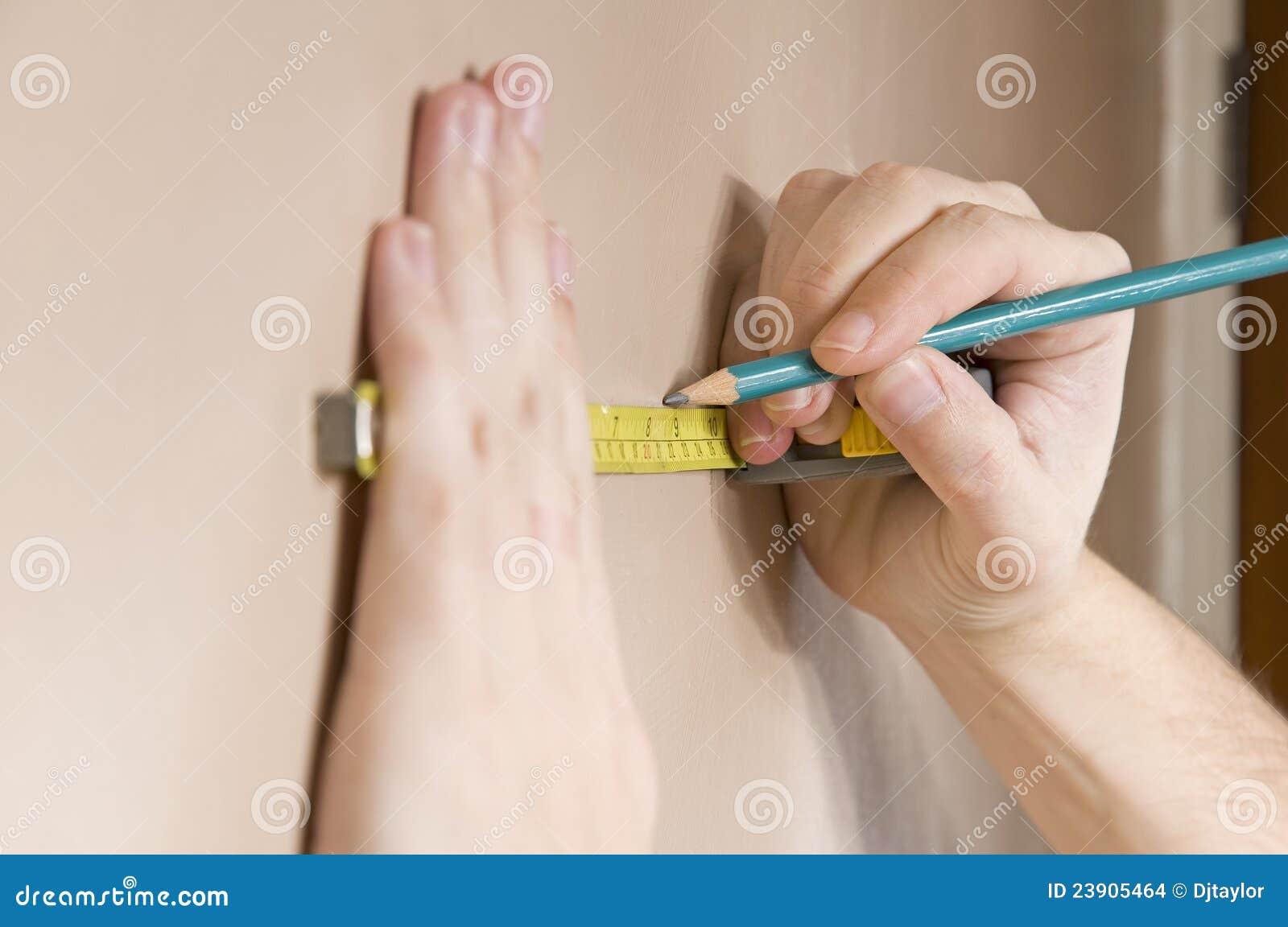 Measuring with Tape Measure on Wall Stock Photo - Image of construction ...