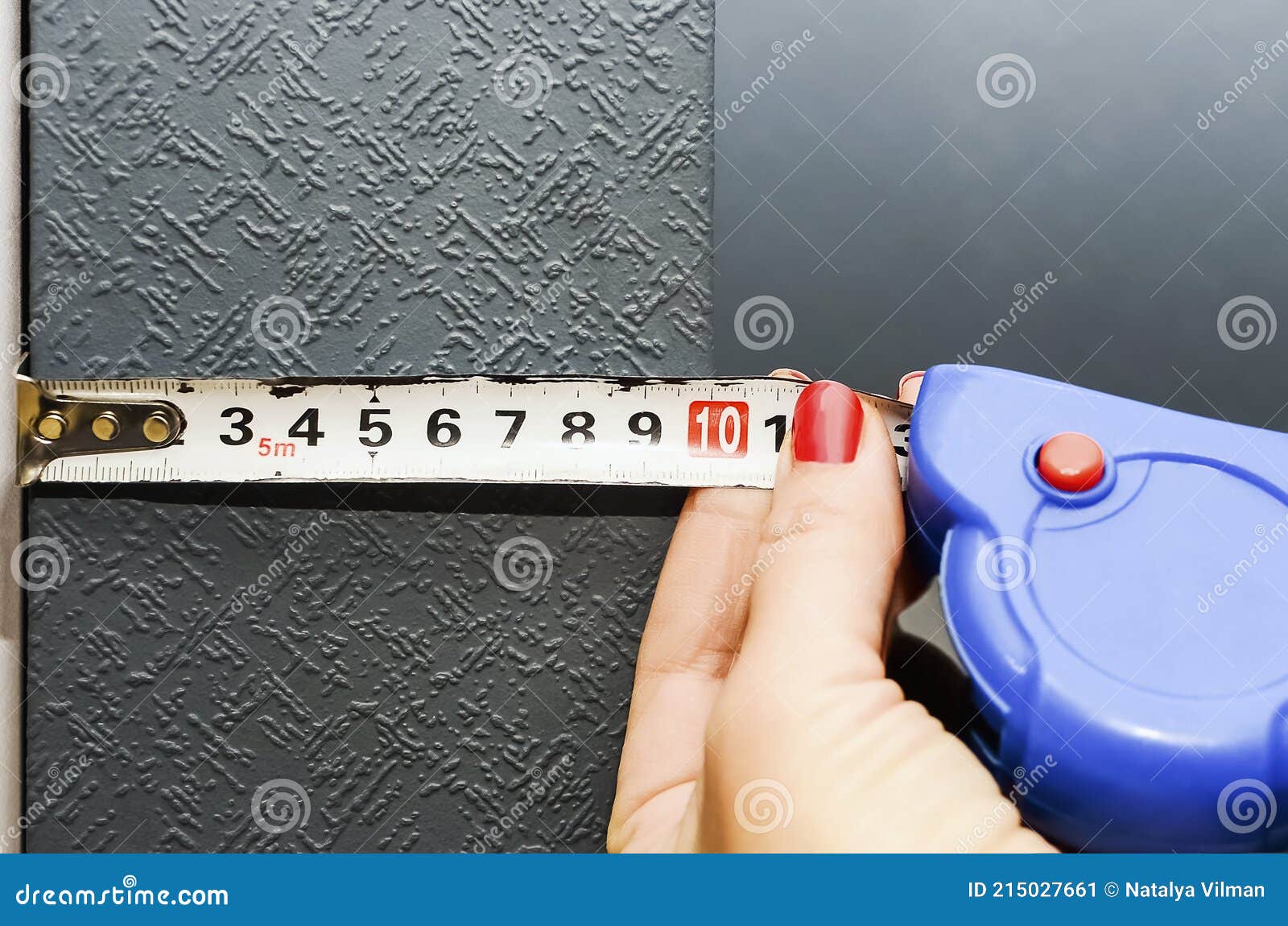 Measuring with a Tape Measure of a Wall, Renovation Concept Stock Image ...
