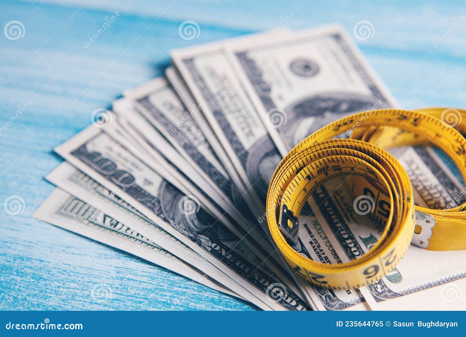 Measuring tape and money stock image. Image of investment - 235644765