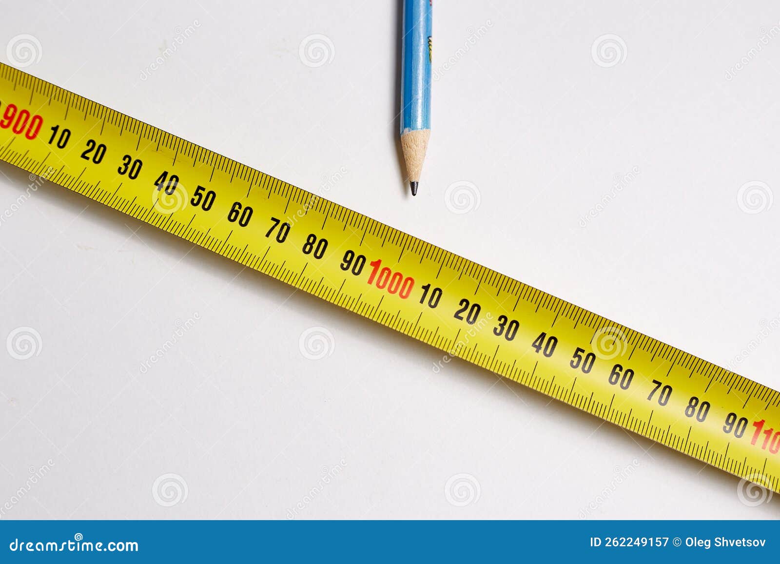 Measuring Tape with a Pencil on a White Background is Needed for ...