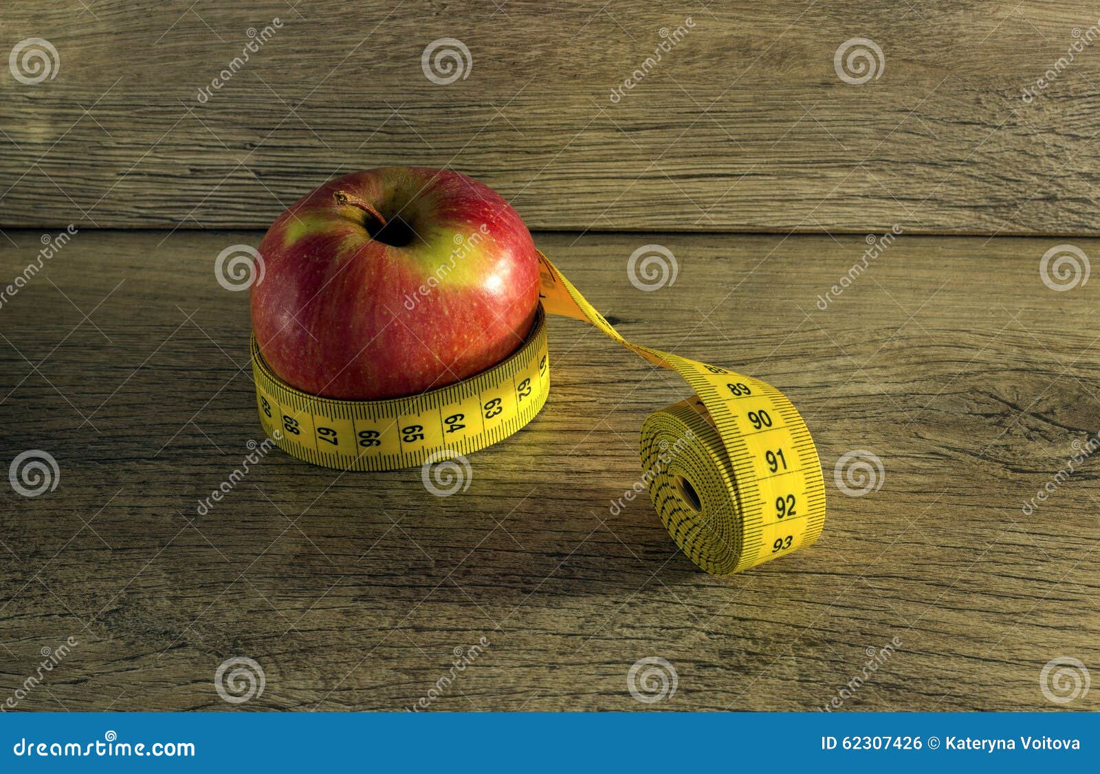 Measuring Tape Wrapped Around an Apple Stock Photo - Image of loss ...