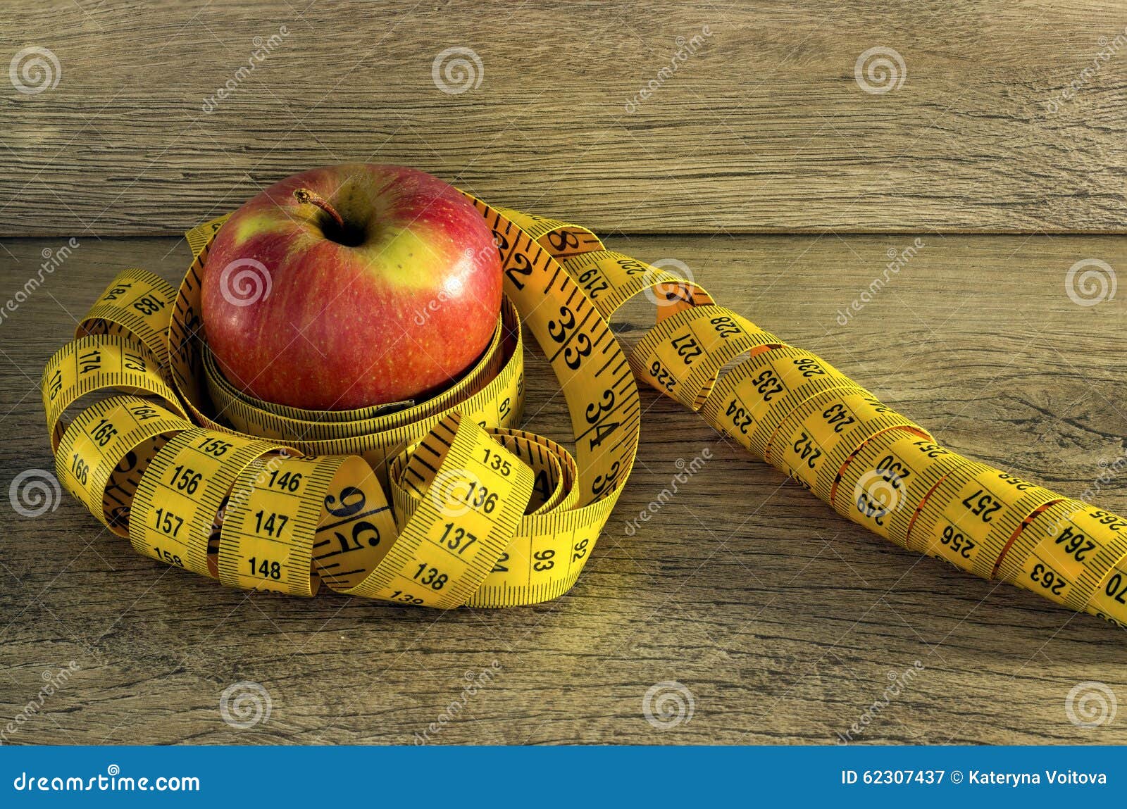 Measuring Tape Wrapped Around an Apple Stock Image - Image of measuring ...