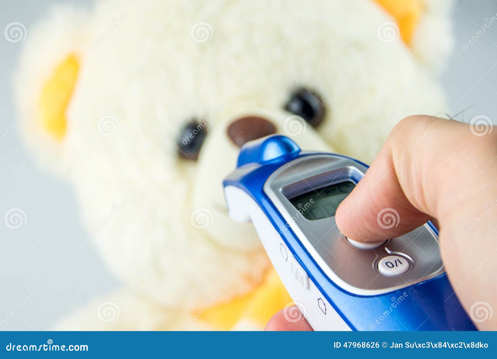 Measuring Temperature with Tele Thermometer Stock Photo - Image of ...