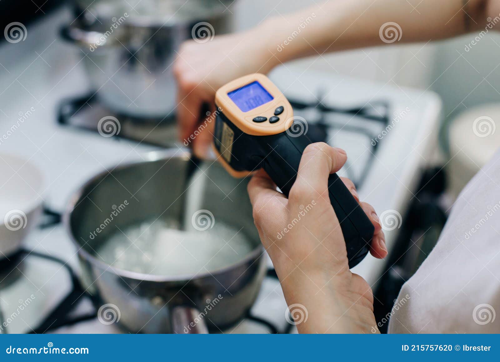 Measuring the Temperature of Water by Digital Thermometer Stock Photo ...