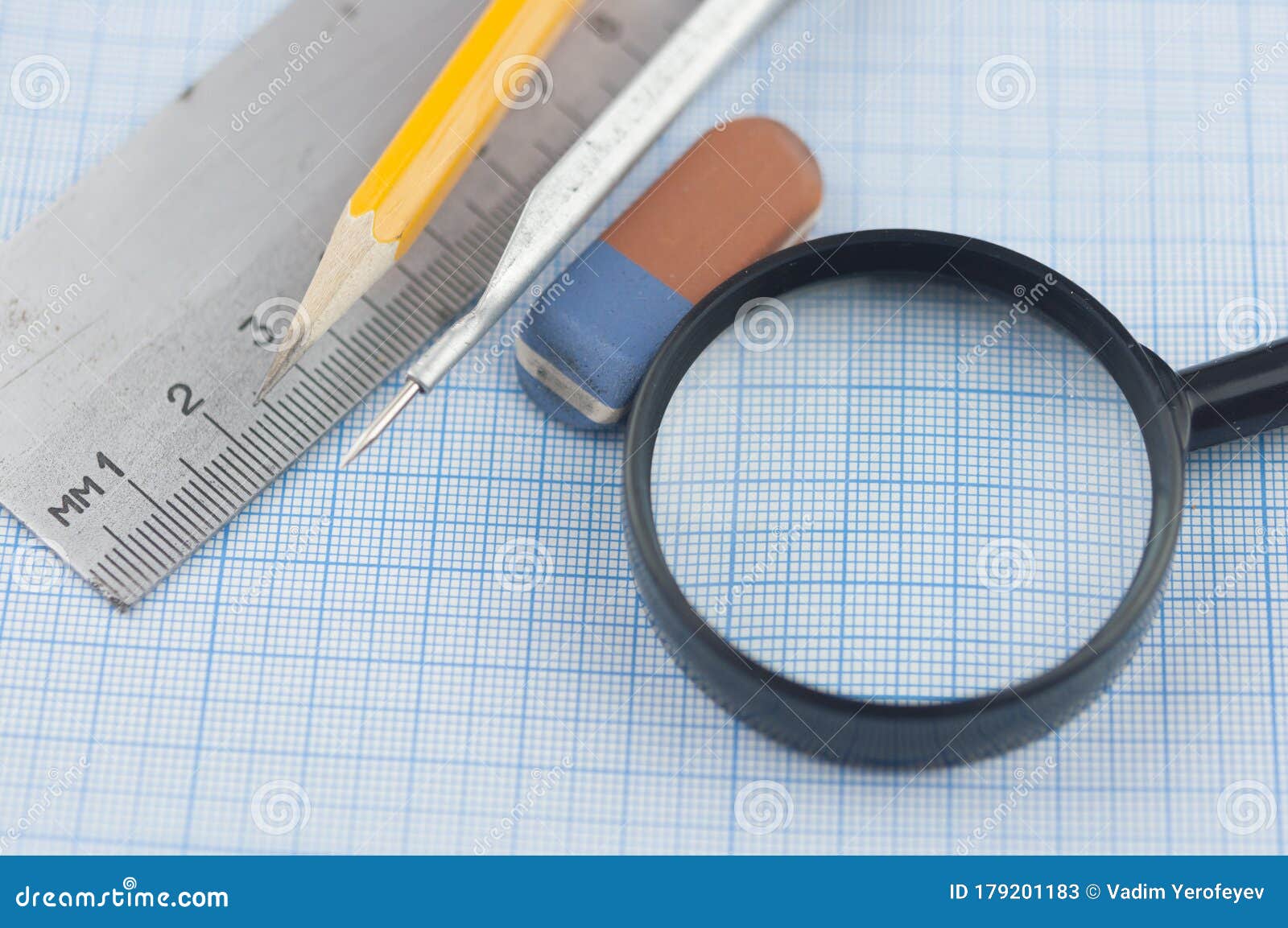 Measuring Tools Above Blue Graph Paper Stock Image - Image of equipment ...