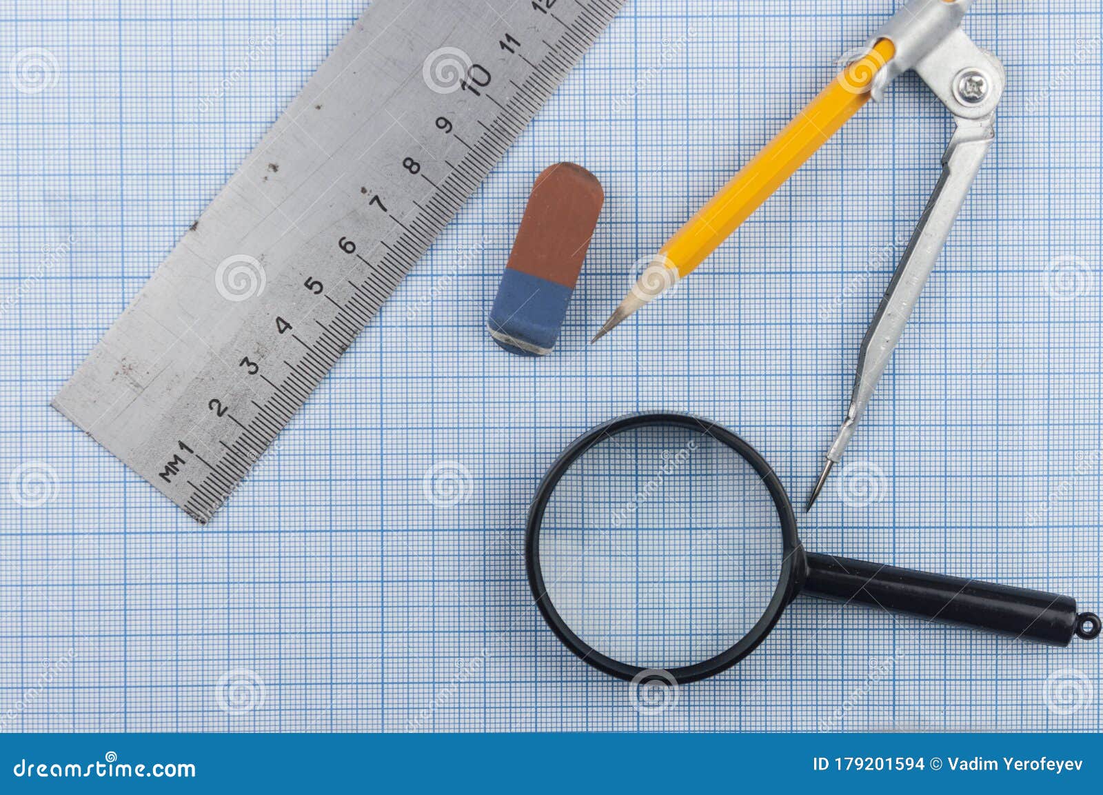 Measuring Tools Above Blue Graph Paper Stock Photo - Image of group ...
