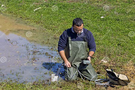 Measuring water quality stock image. Image of outside - 24256777