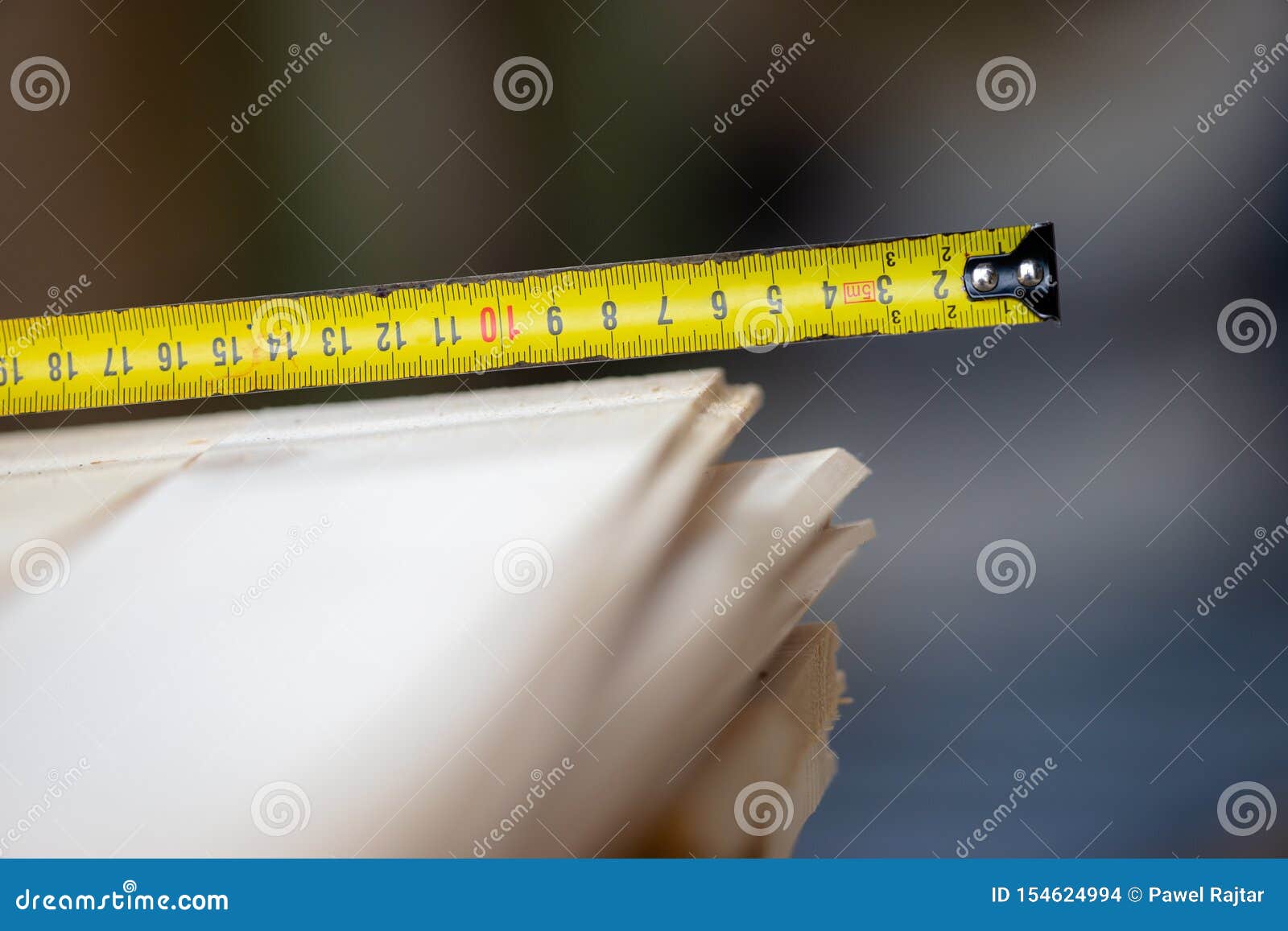 Measuring Wood To Be Cut with a Measure Stock Photo - Image of rough ...