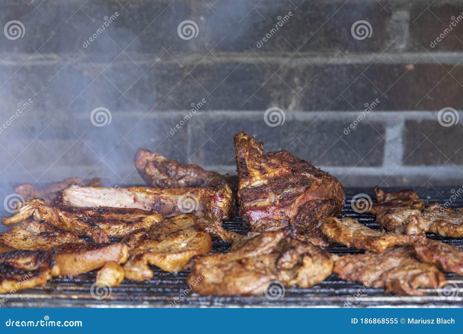 Meat on the barbecue grill stock image. Image of cooking - 186868555