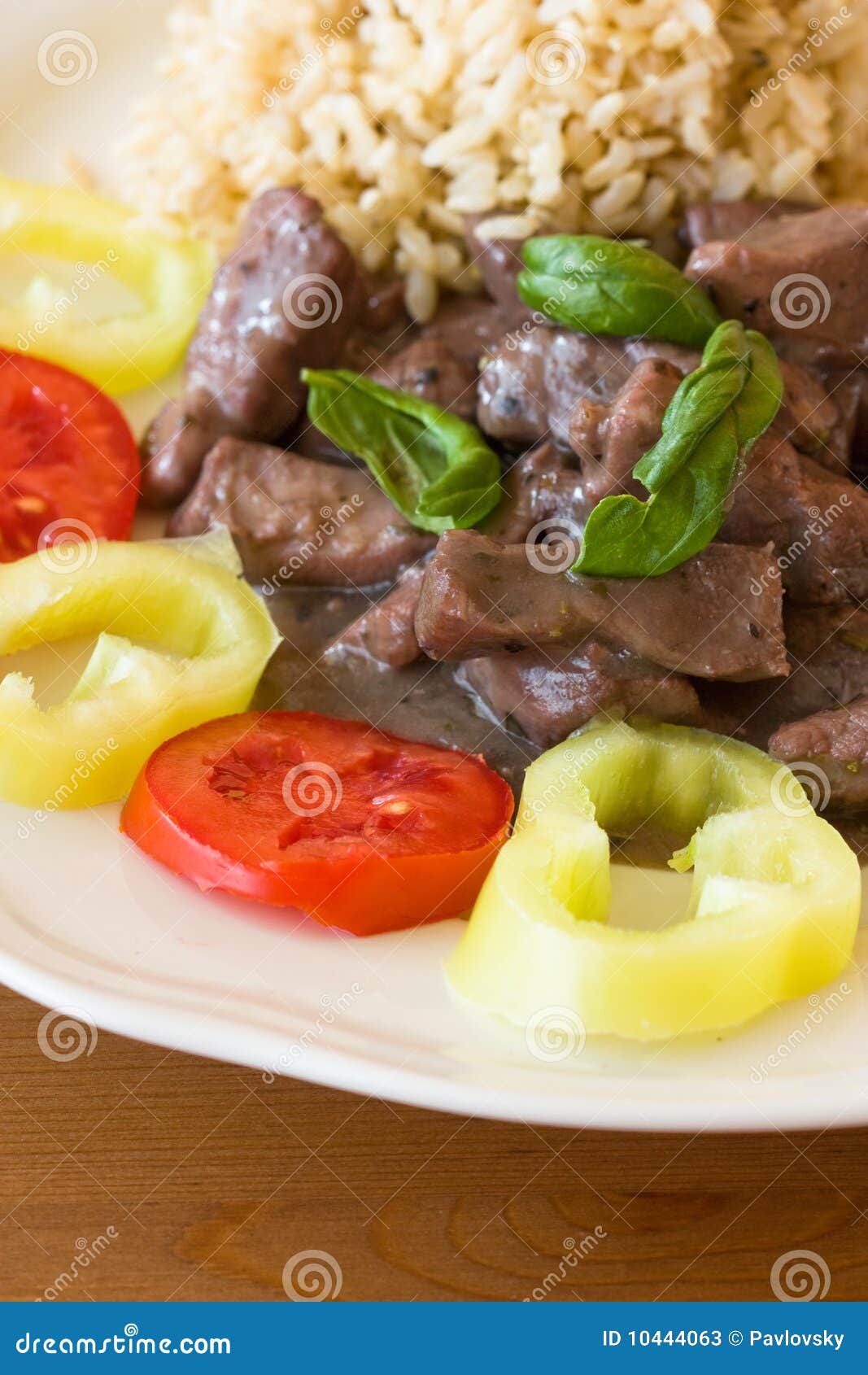 Meat with Brown Rice and Garnish Stock Image - Image of paprika, chef ...