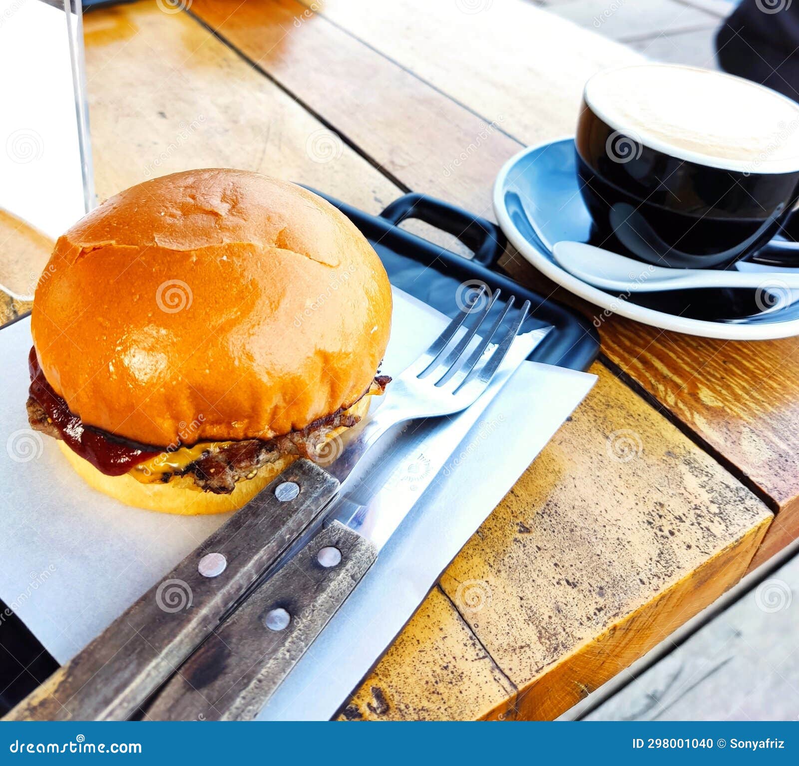 Meat Burger on the Table Served with a Cup of Coffee Stock Photo ...