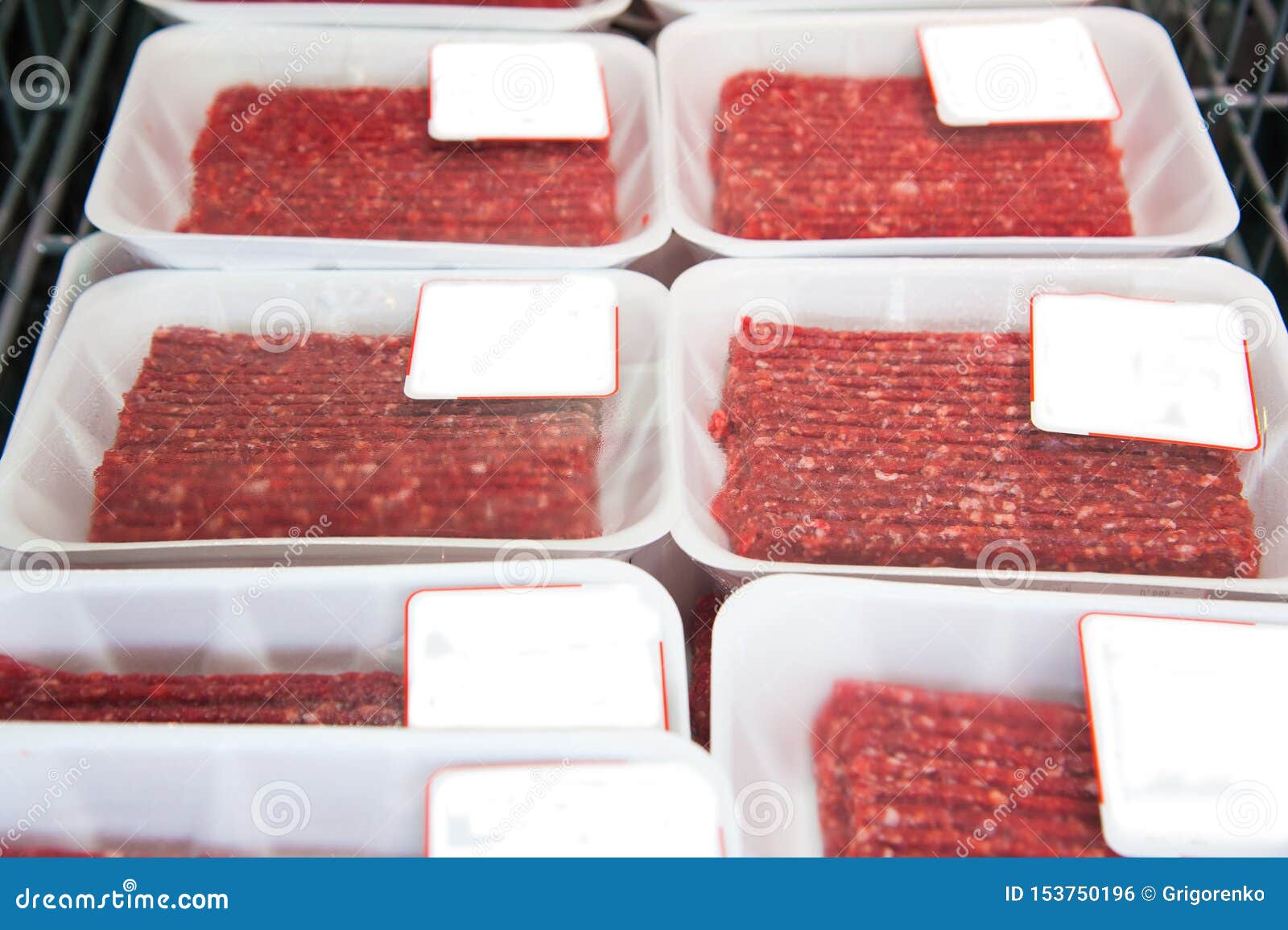 Meat at a butcher shop stock photo. Image of counter - 153750196