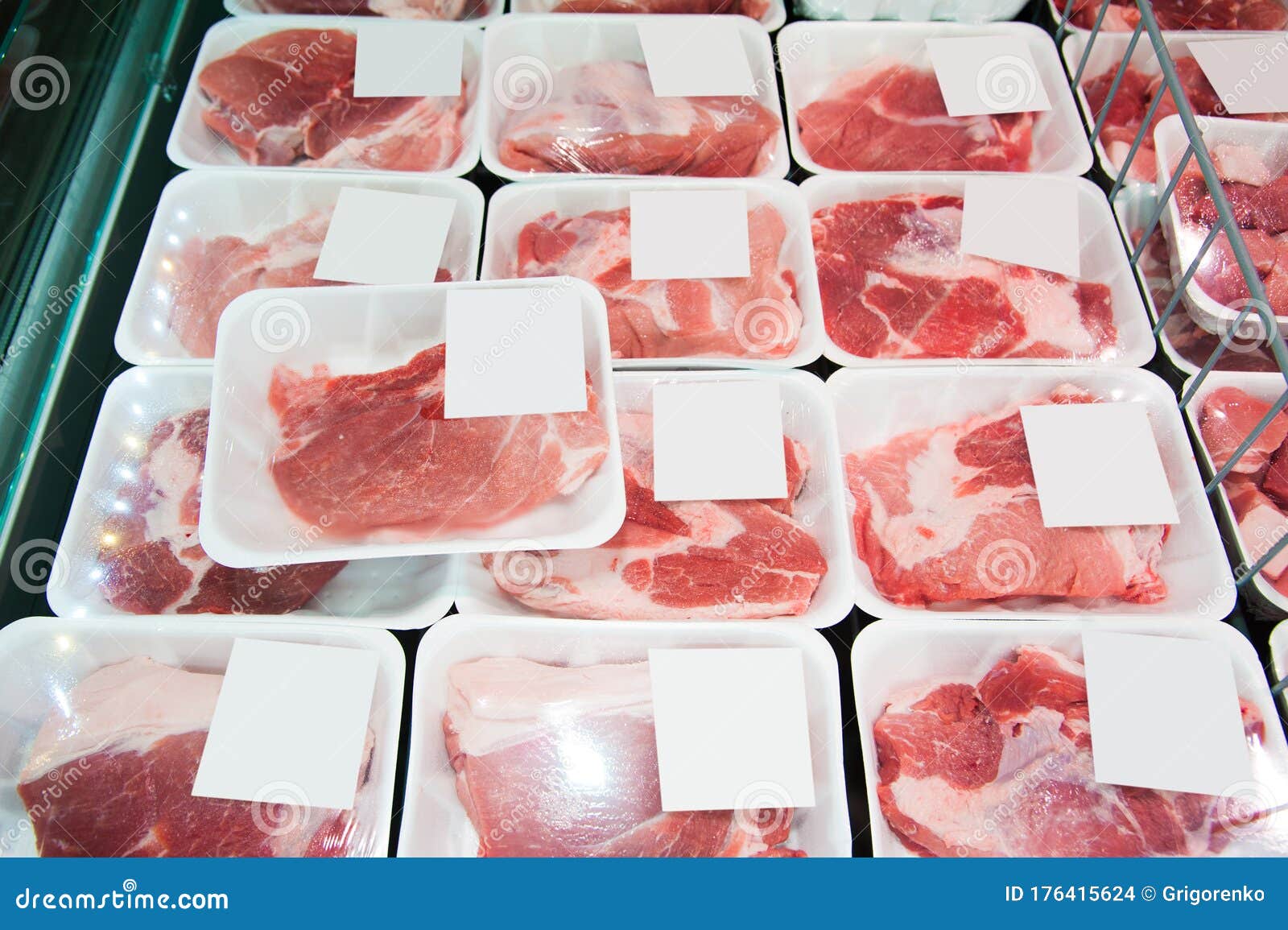 Meat at a butcher shop stock photo. Image of grocery - 176415624