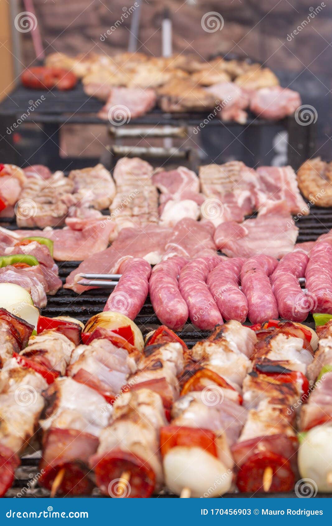 Meat on the charcoal grill stock image. Image of fire - 170456903
