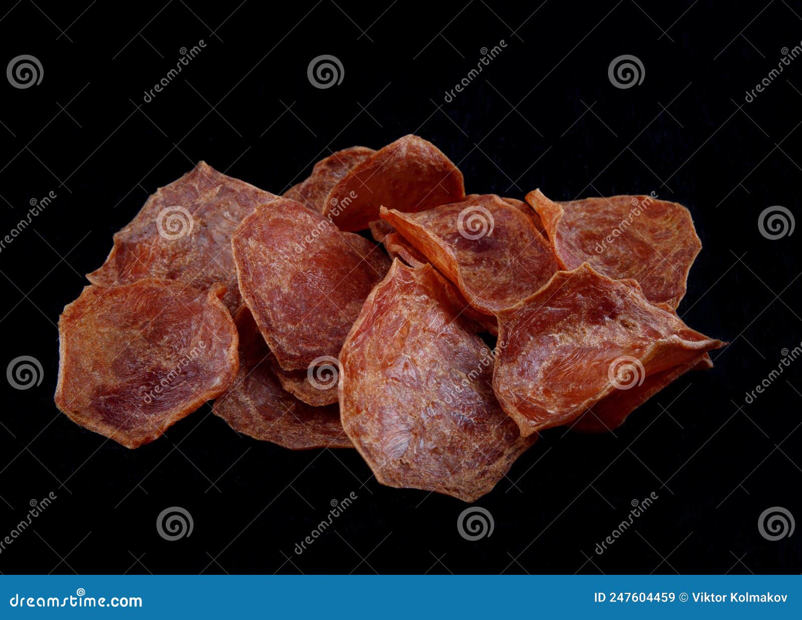 Meat Chips on a Black Background. Beautiful Placer of Thin Slices of ...
