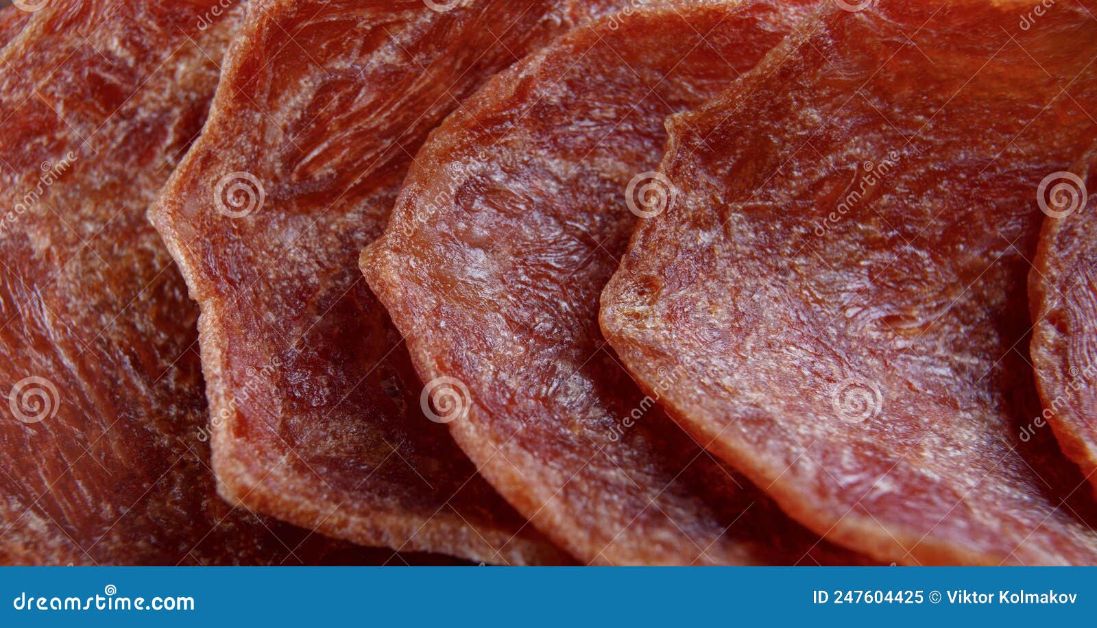 Meat Chips are Laid Out in a Row. Thin Pieces of Dried Meat Stock Image ...