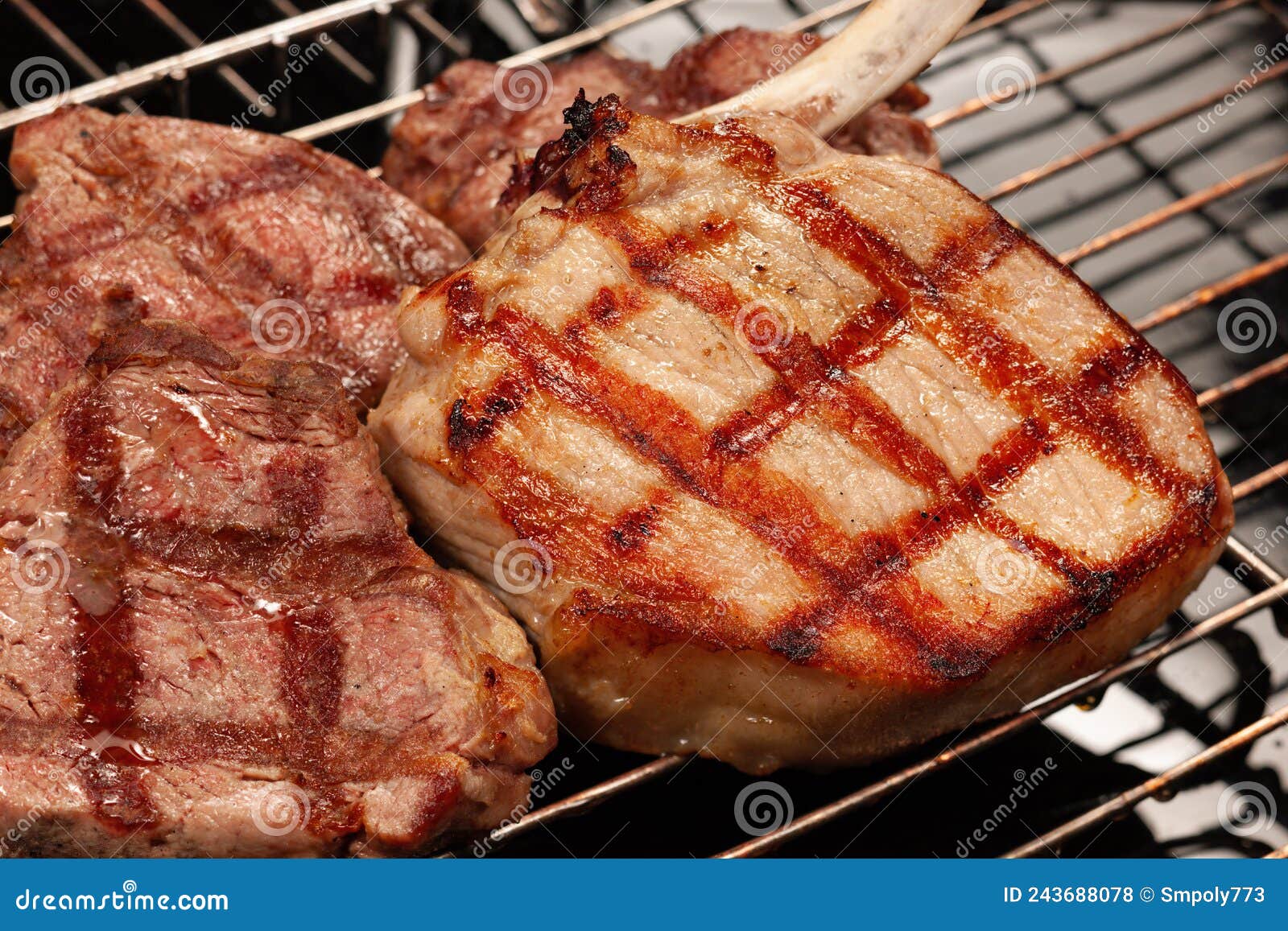 The Meat is Cooked on the Grill with the Grill Stock Photo - Image of ...