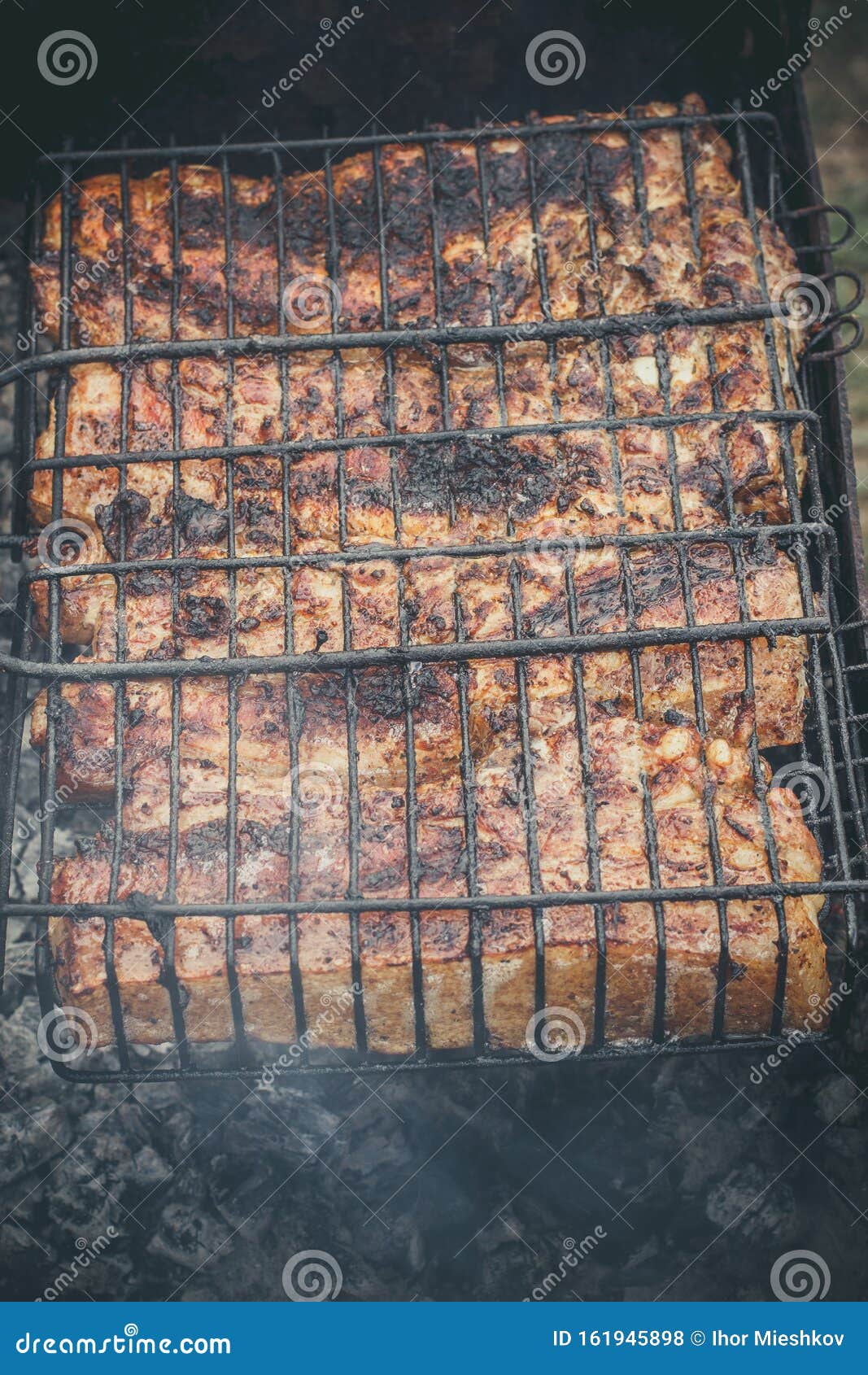 The Meat is Fried in a Grid on the Grill Stock Photo - Image of cookout ...