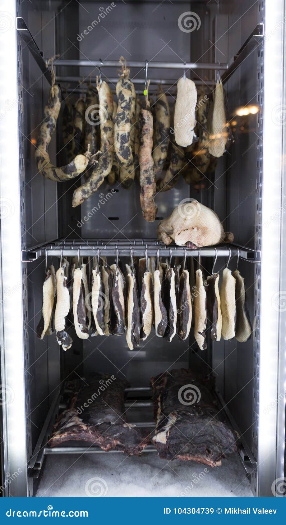 Meat hanging cool storage stock image. Image of butchery - 104304739