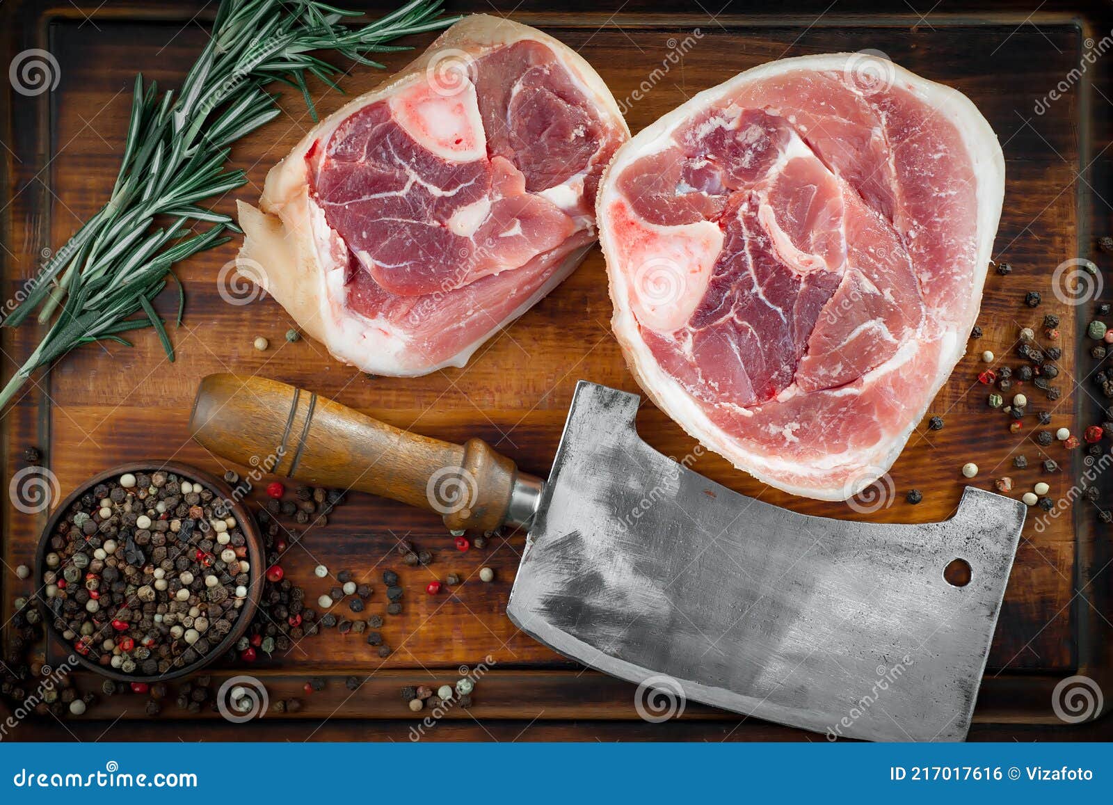 Meat with Kitchen Accessories on an Old Background. Stock Photo - Image ...