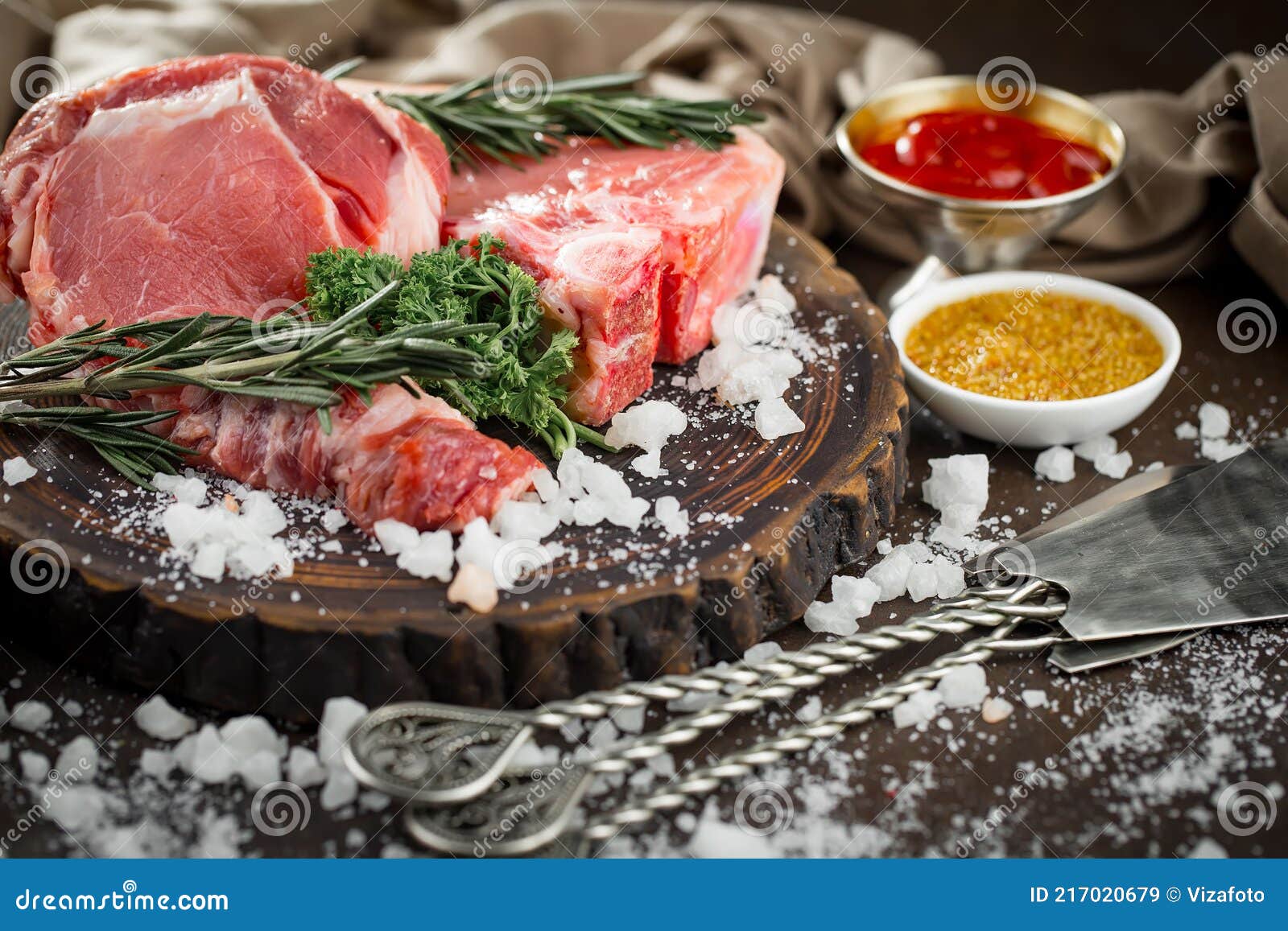 Meat with Kitchen Accessories on an Old Background. Stock Image - Image ...