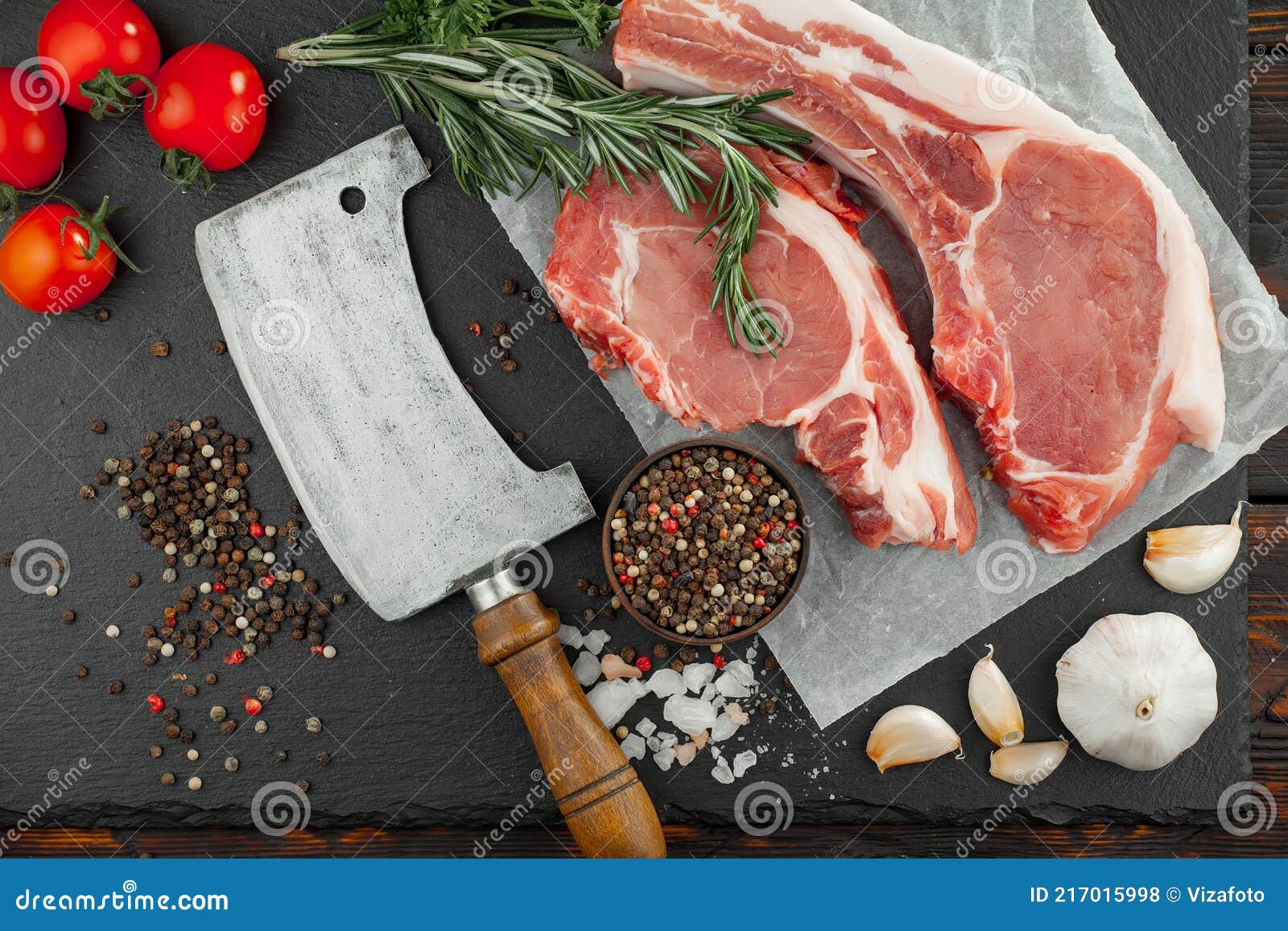 Meat with Kitchen Accessories on an Old Background. Stock Photo - Image ...