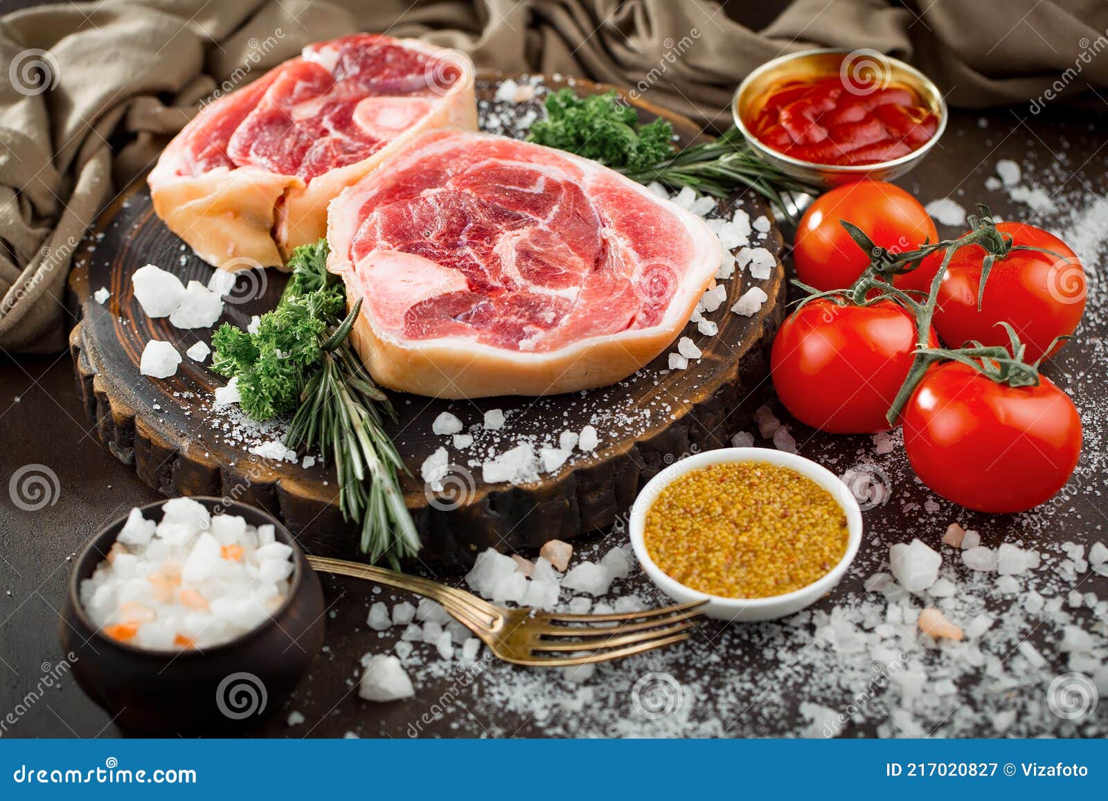 Meat with Kitchen Accessories on an Old Background. Stock Image - Image ...