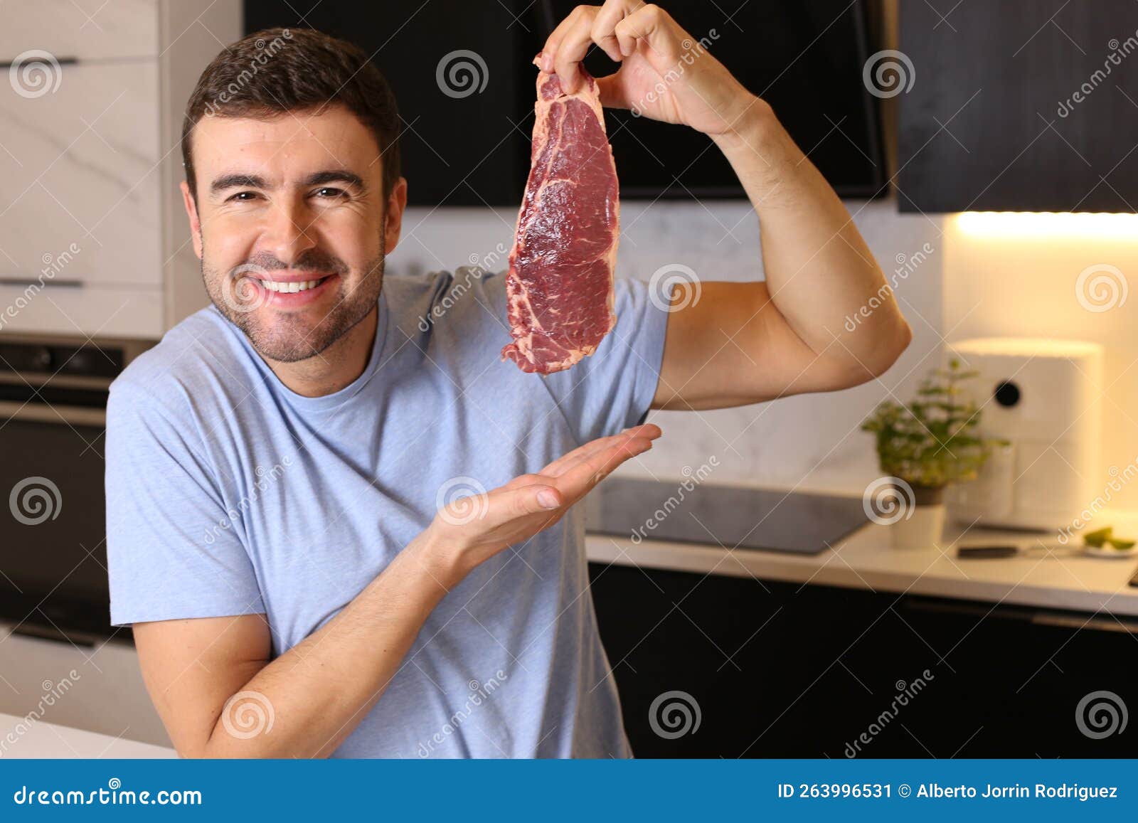 Meat Lover Showing a Delicious Raw Steak Stock Image - Image of ...