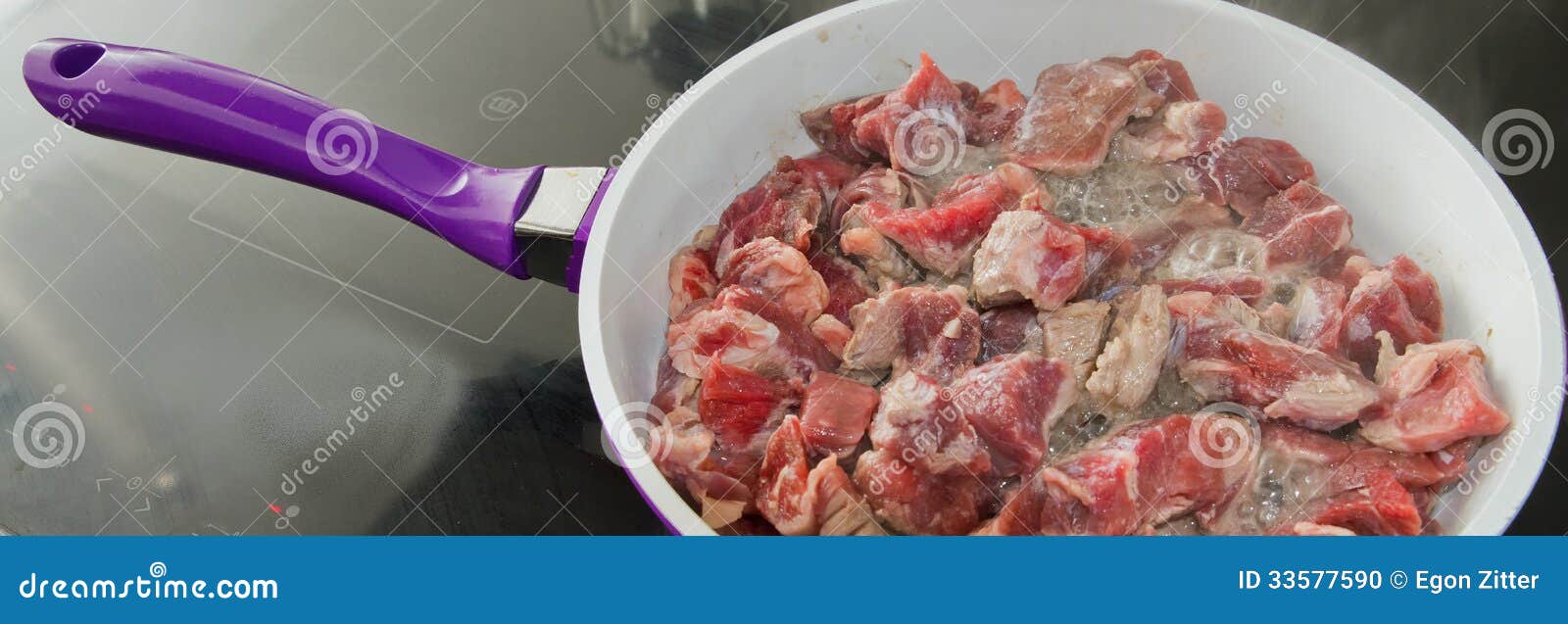 Meat in a pan stock photo. Image of induction, uncooked - 33577590