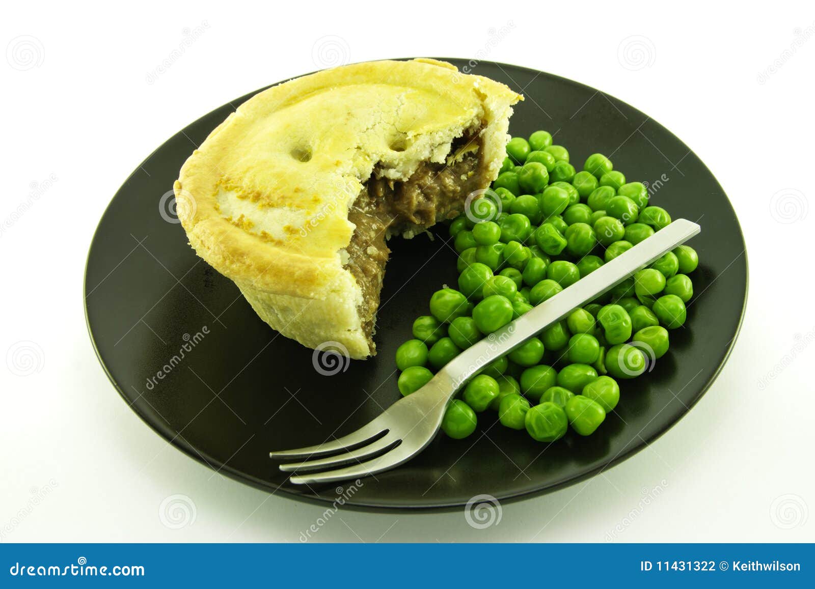 Meat Pie on a Black Plate stock photo. Image of gravy - 11431322
