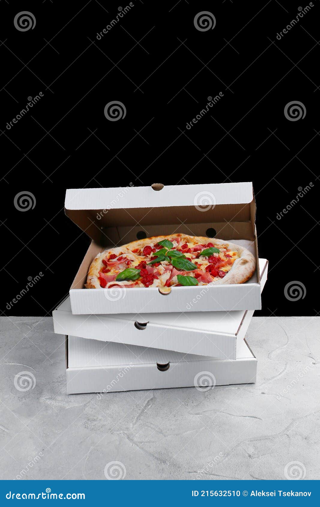Meat Pizza Inside Box. Stack of Pizza Boxes Standing on Concrete Table ...