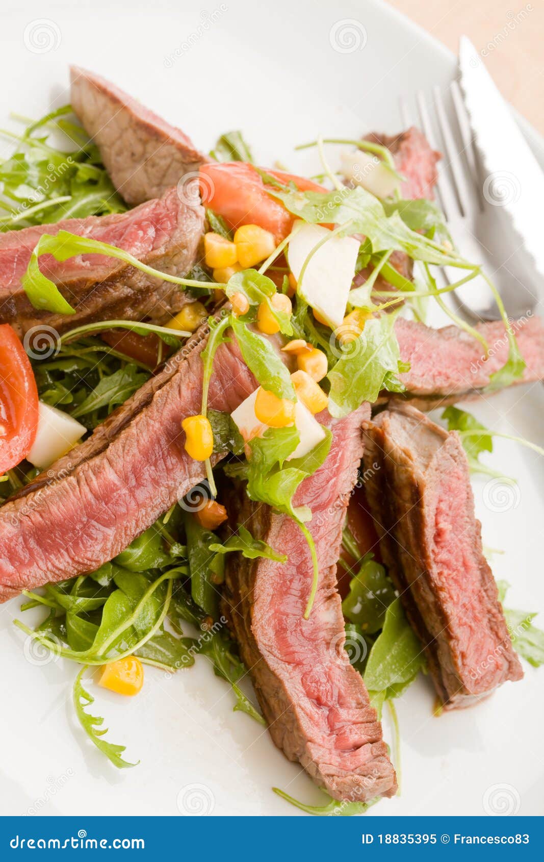 Meat with Rocket salad stock image. Image of tomatoes - 18835395