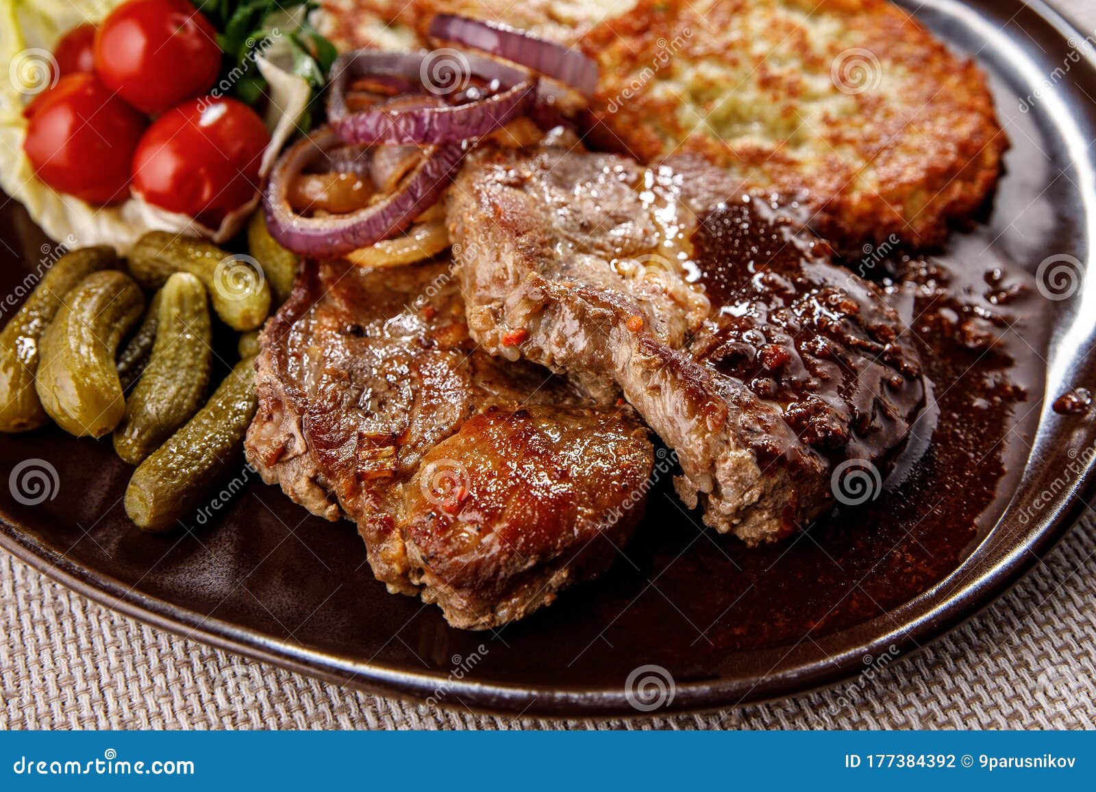 Meat in Sauce with Garnish on a Plate Stock Photo - Image of spicy ...