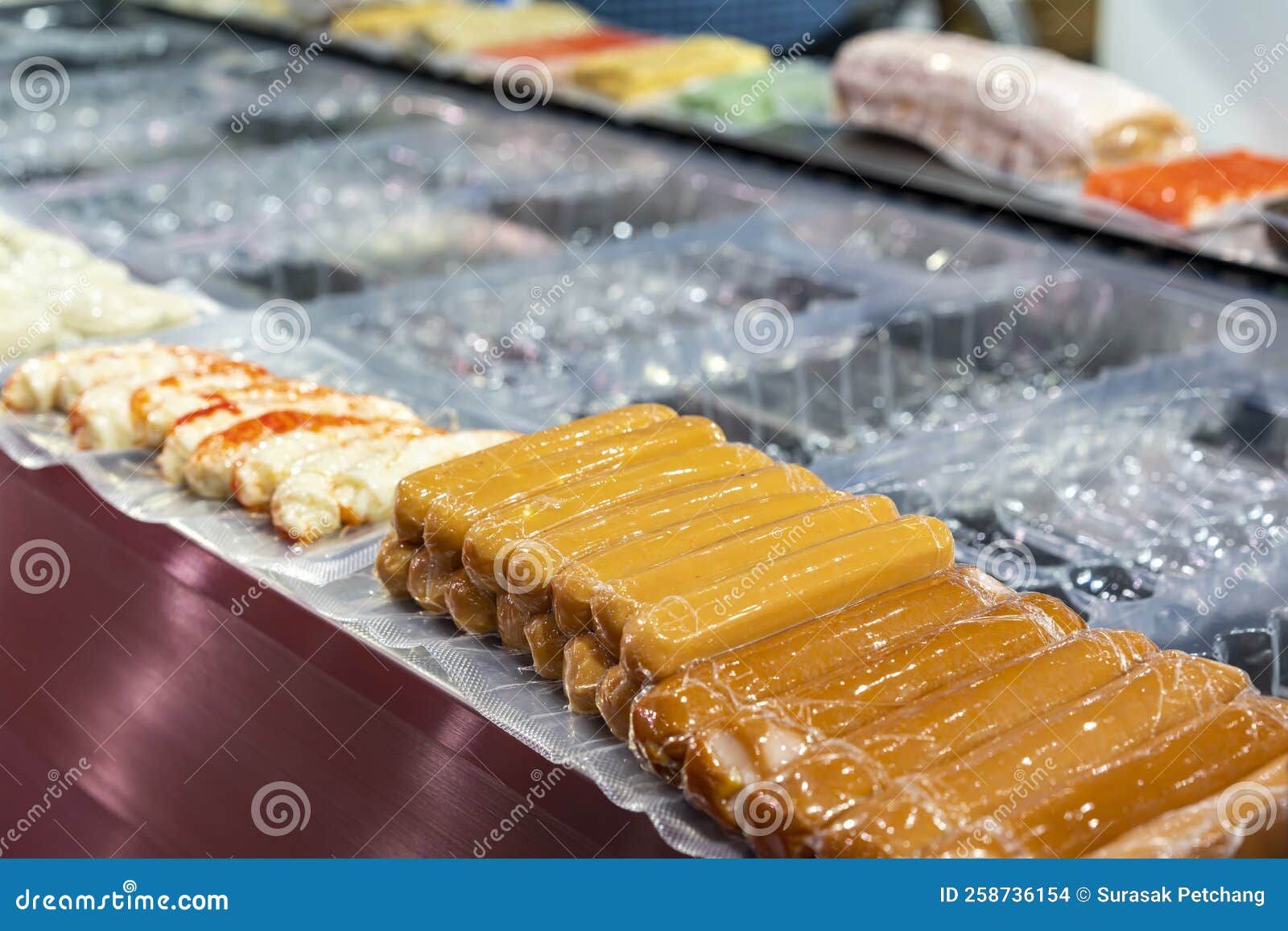 Meat Sausage after Packing in Transparent Envelope Plastic on Automatic ...