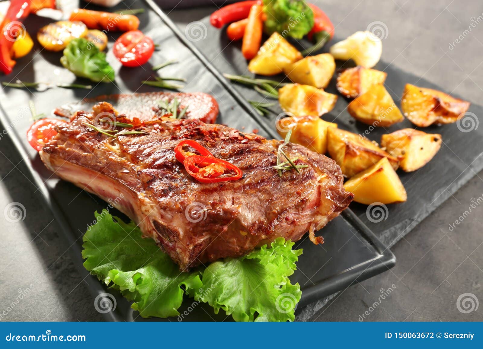 Meat Served with Vegetable Garnish on Plate Stock Photo - Image of ...