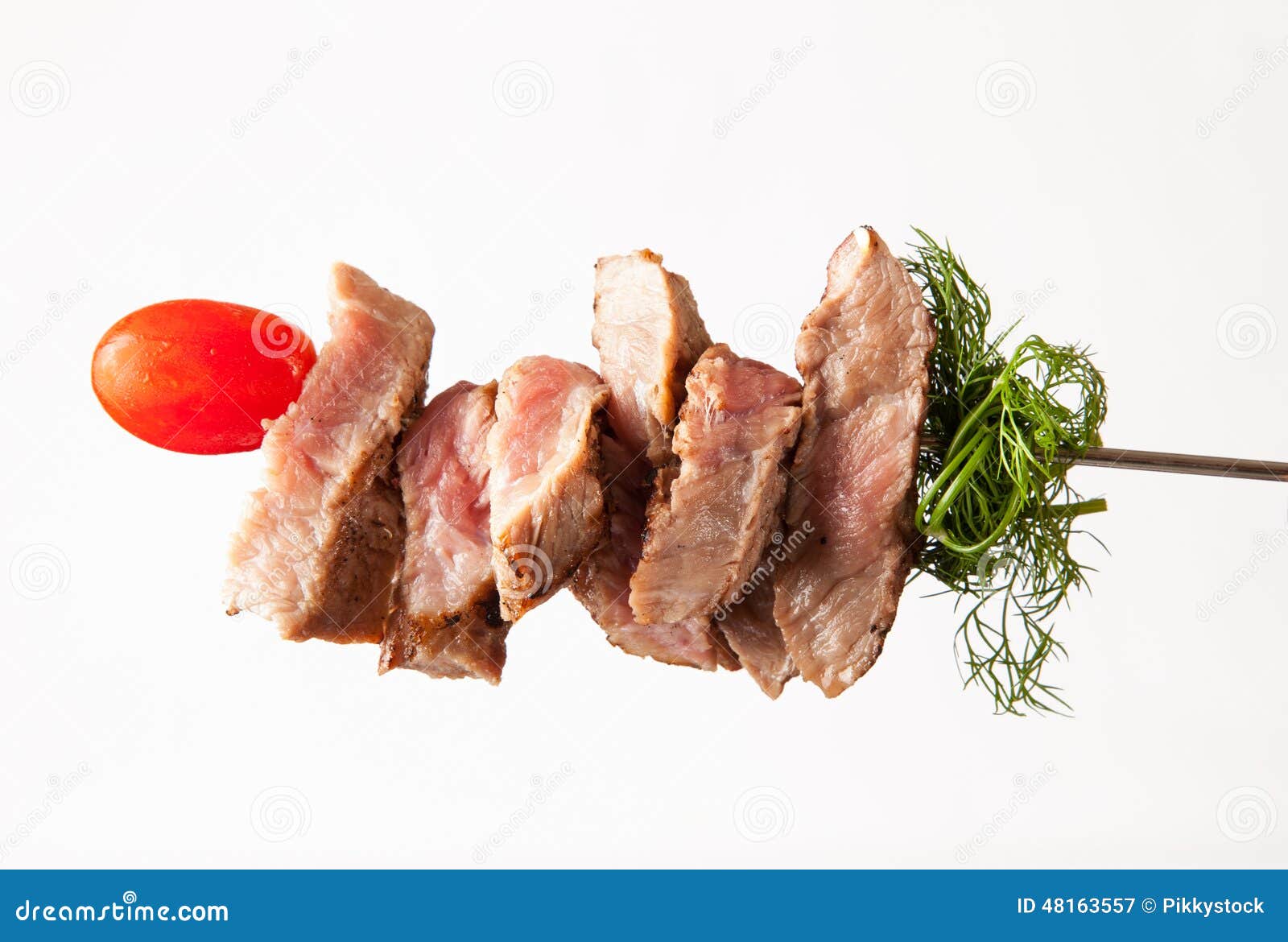 Meat on the spit on white stock image. Image of plate - 48163557