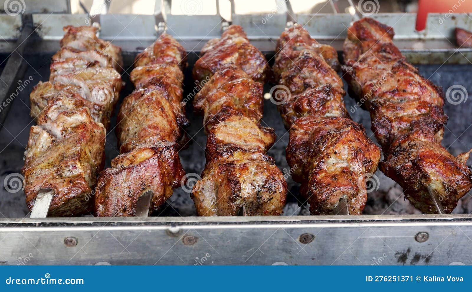 A Meat Steak Fried on a Wire Rack with Smoke and Fire Stock Image ...