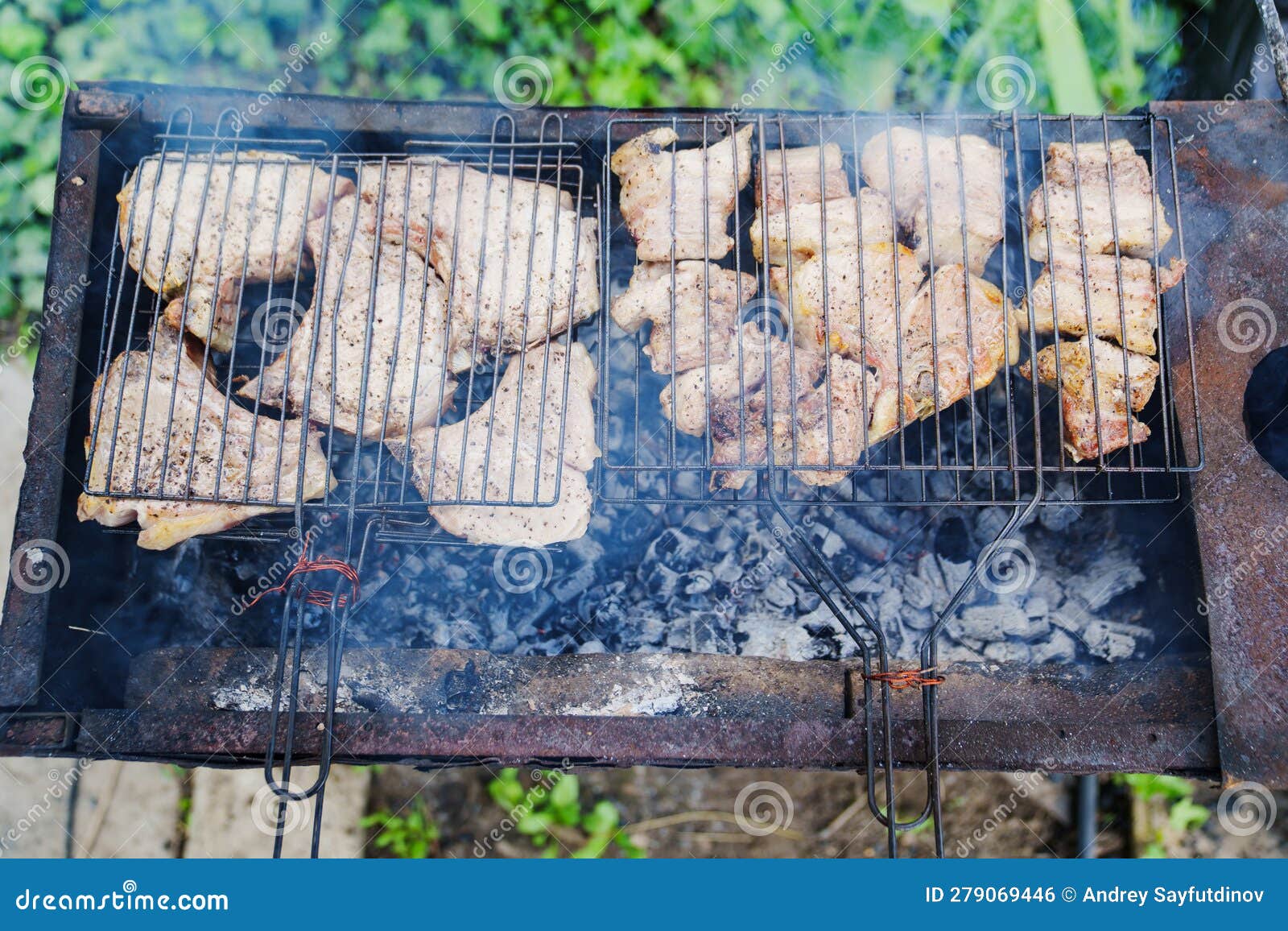 Meat Steaks on a Grill Rack Cooking Over an Open Fire Stock Photo ...
