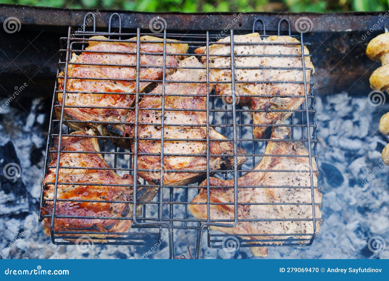 Meat Steaks on a Grill Rack Cooking Over an Open Fire Stock Photo ...
