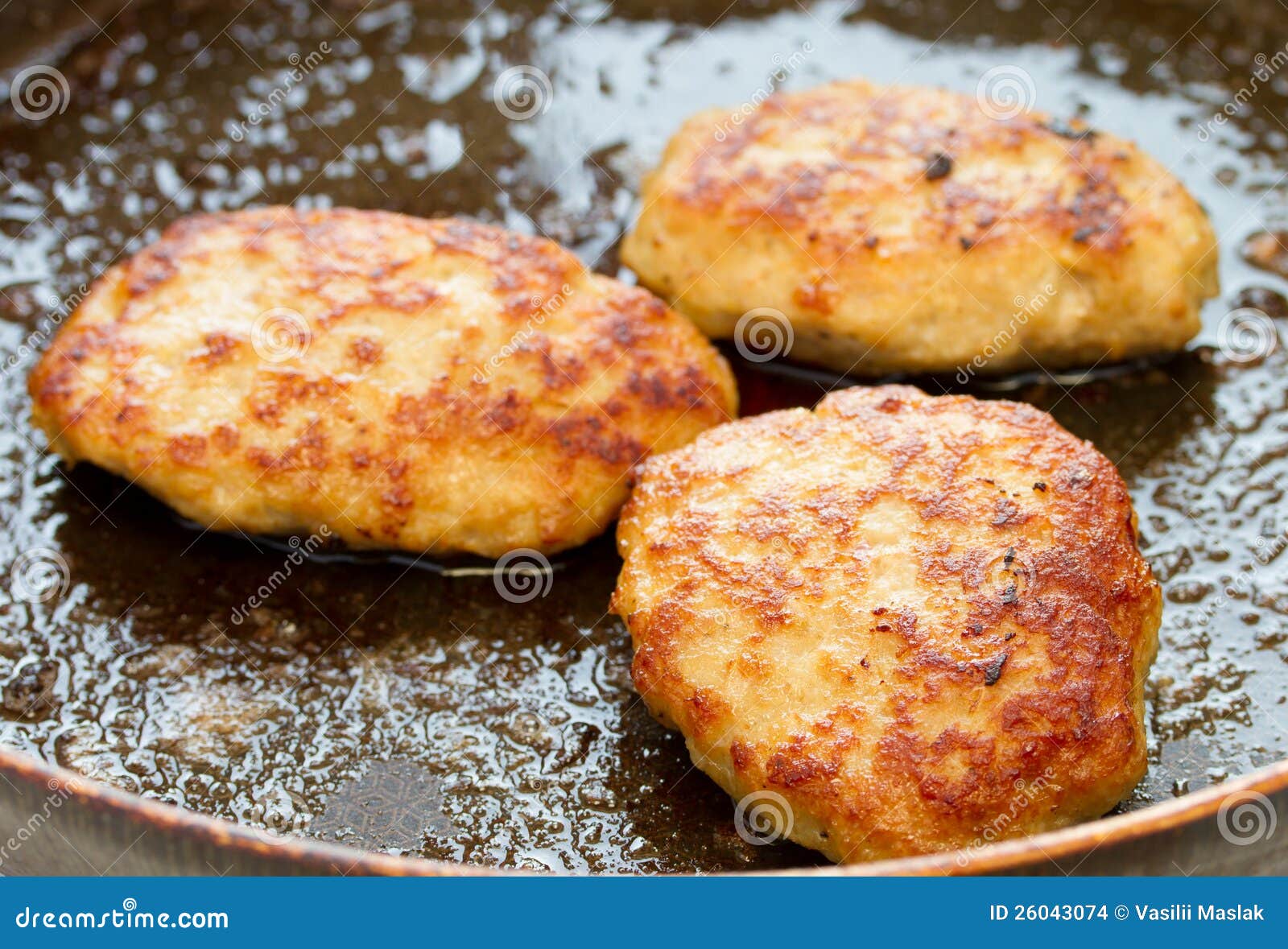 Meatballs cooking in a pan stock photo. Image of cooked - 26043074