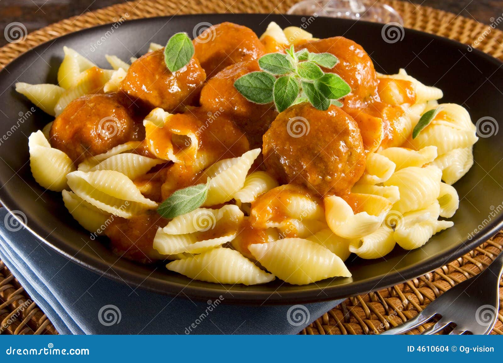 Meatballs and pasta shells stock photo. Image of leaf - 4610604