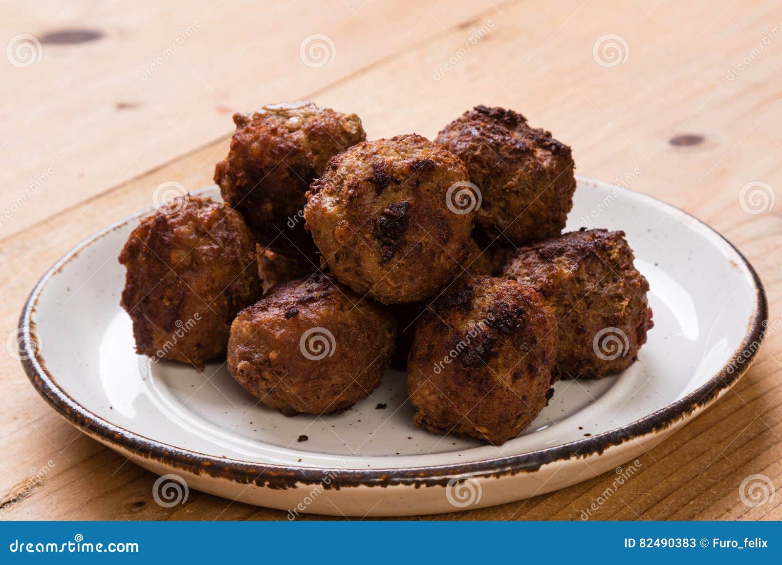 Meatballs on rustic table stock image. Image of lunch - 82490383