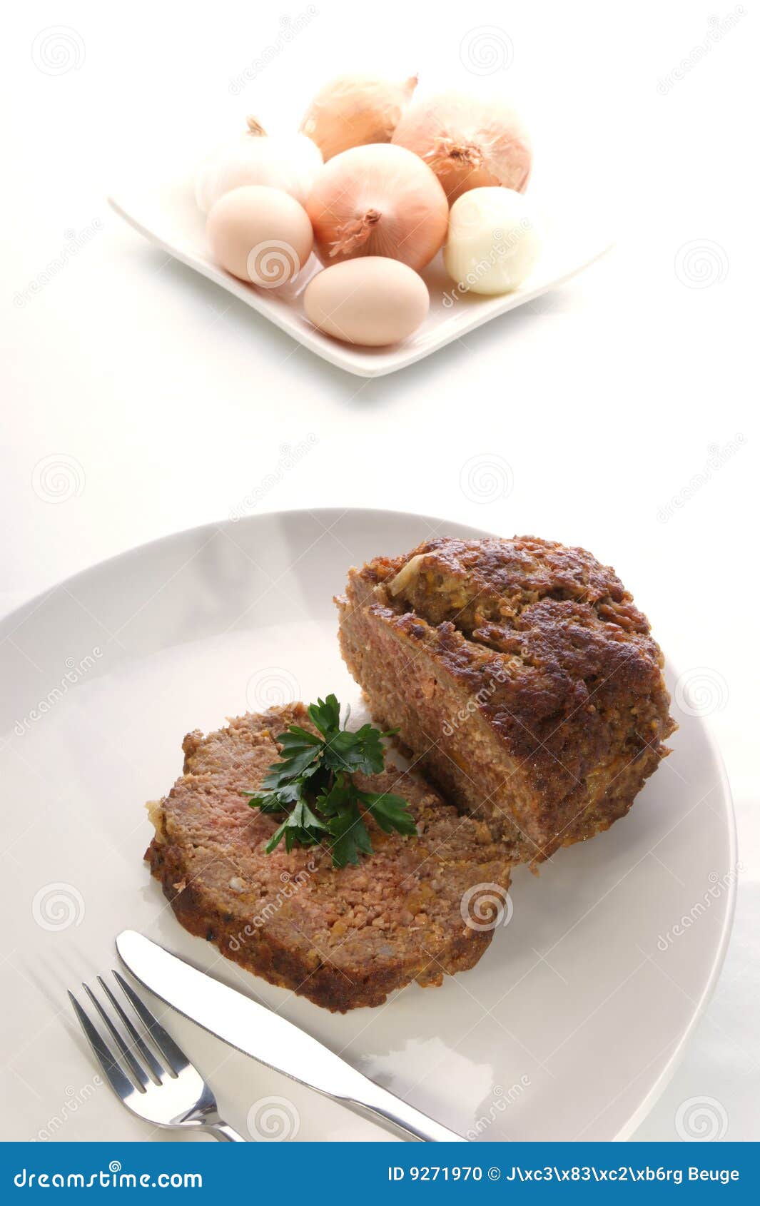 Meatloaf on a white plate stock photo. Image of baked - 9271970