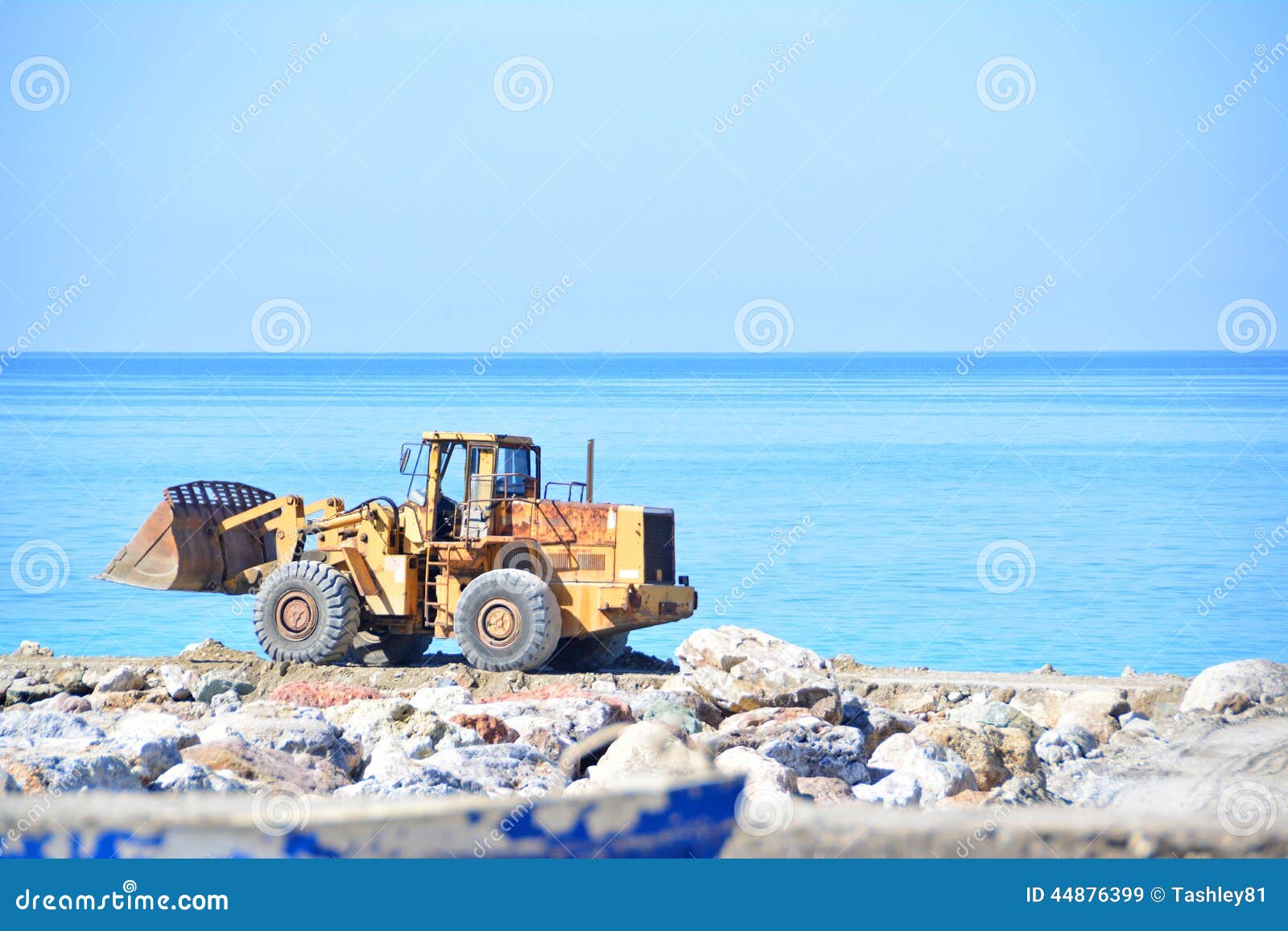 A mechancial digger stock image. Image of coastal, excavator - 44876399