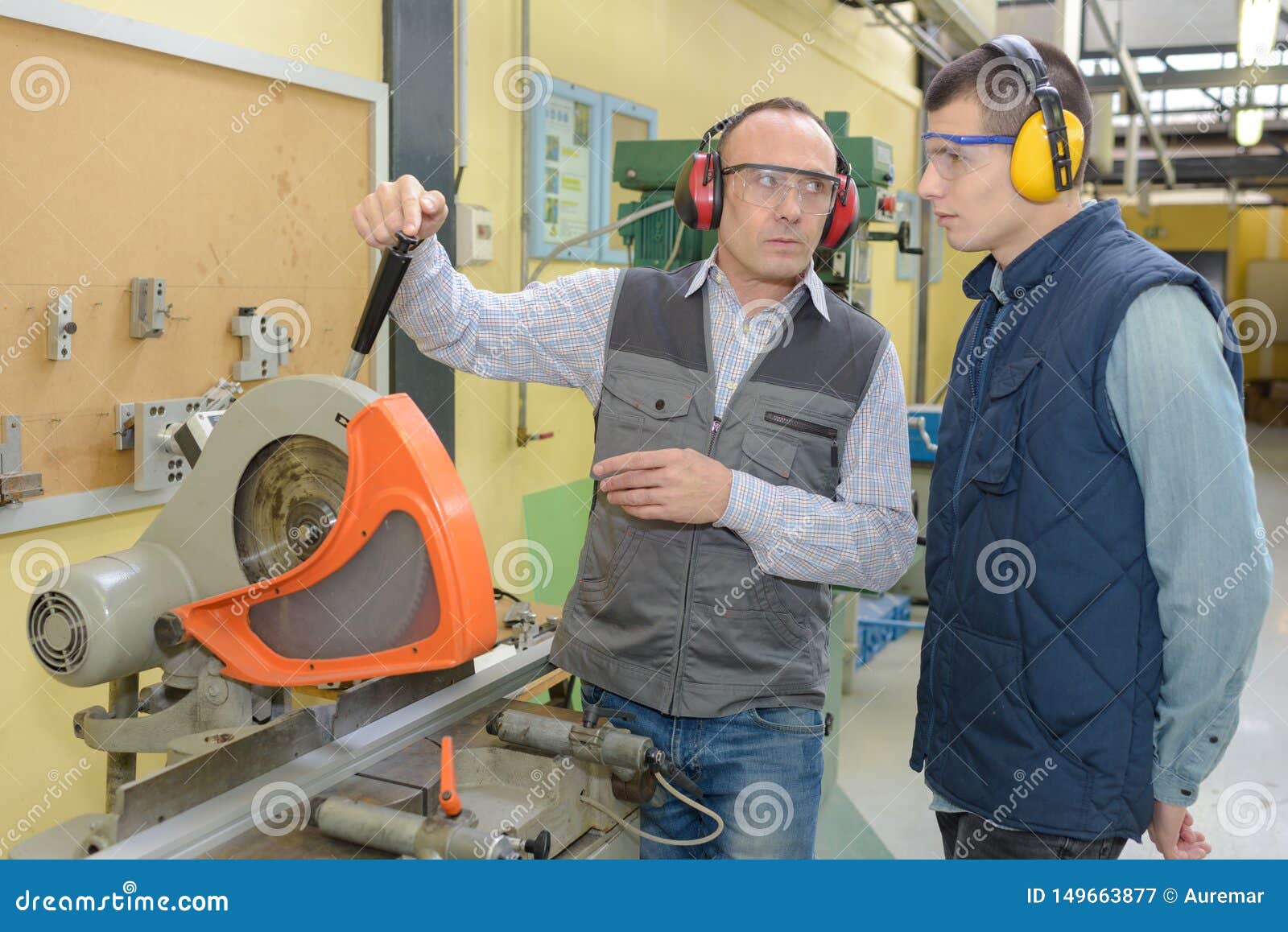 Mechanic and Apprentice Working Together Stock Image - Image of smiling ...