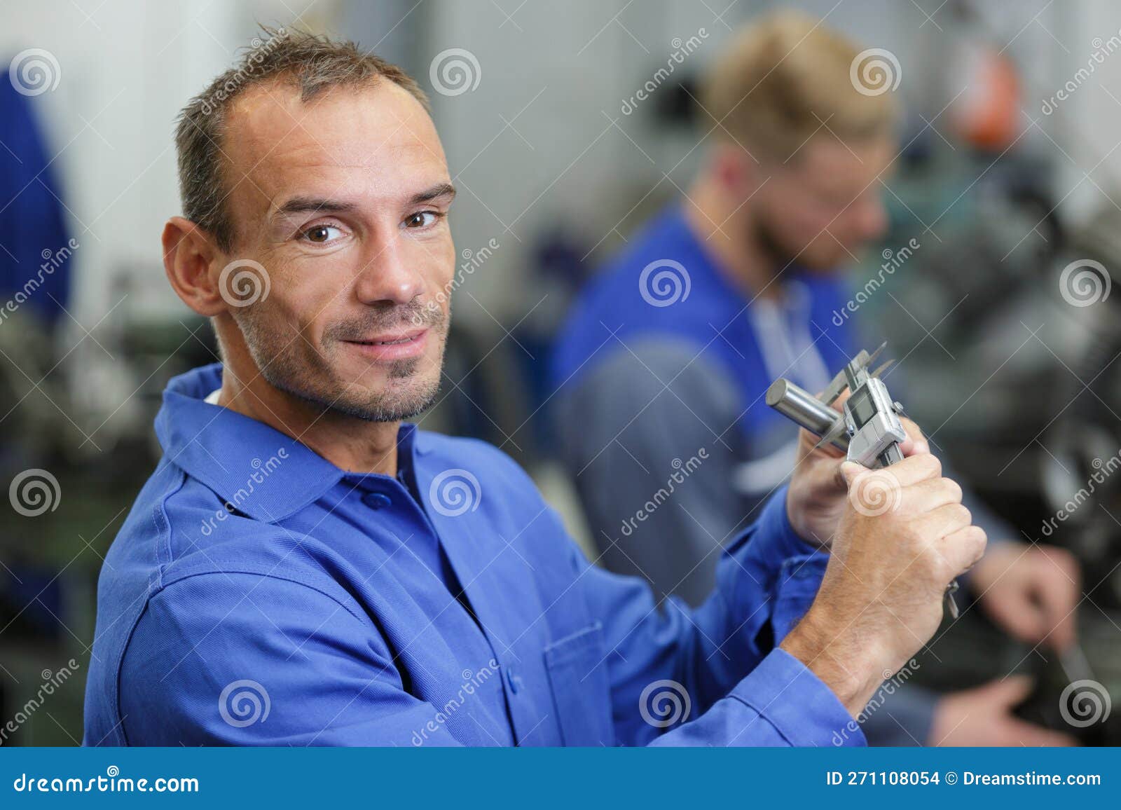 Mechanic Assembling Mechanical Parts Stock Photo - Image of test ...