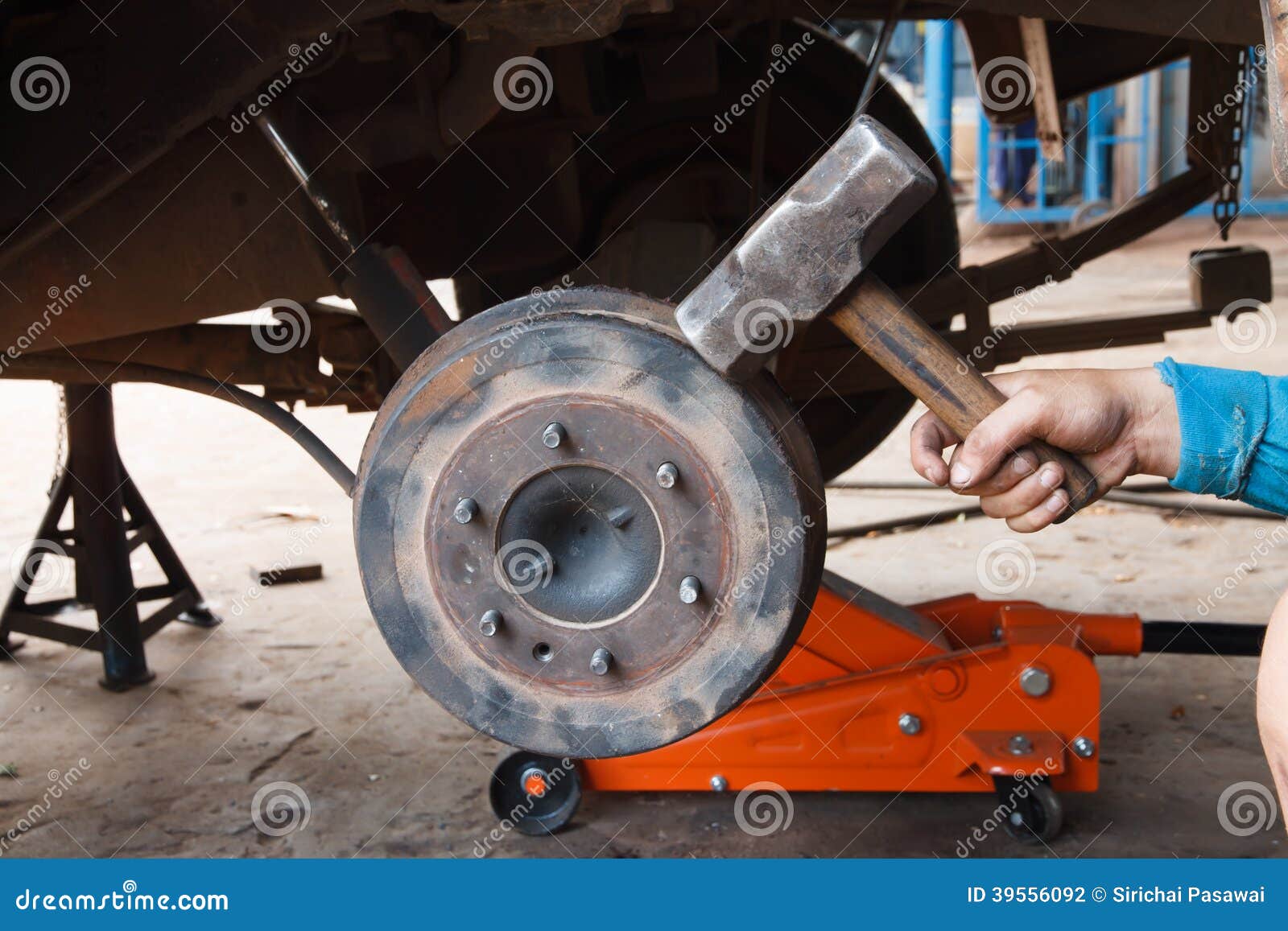 Mechanic stock photo. Image of repairman, garage, tire - 39556092