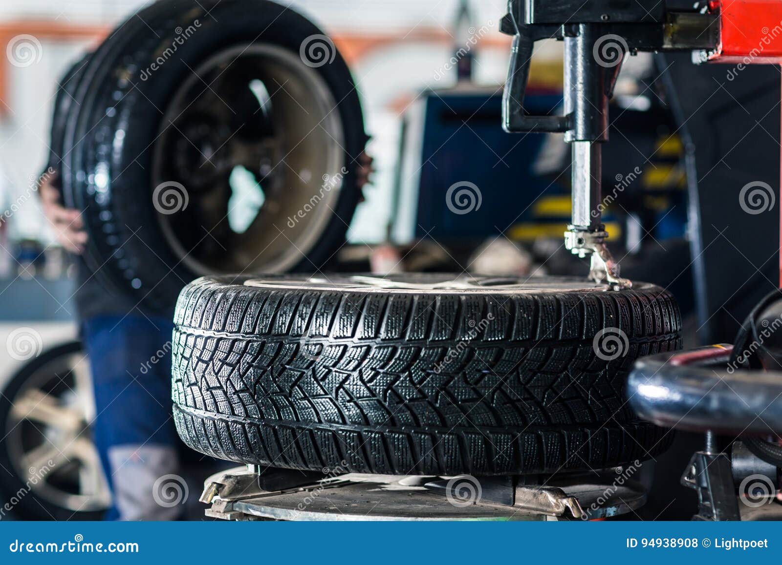 The Mechanic Changes Wheels To a Modern Car Stock Photo - Image of auto ...
